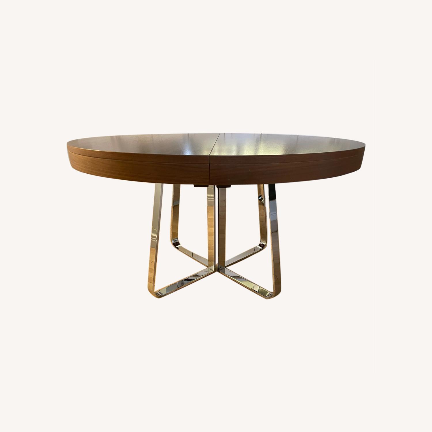 Ligne Roset Ava Dining Table in Walnut Veneer. - AptDeco