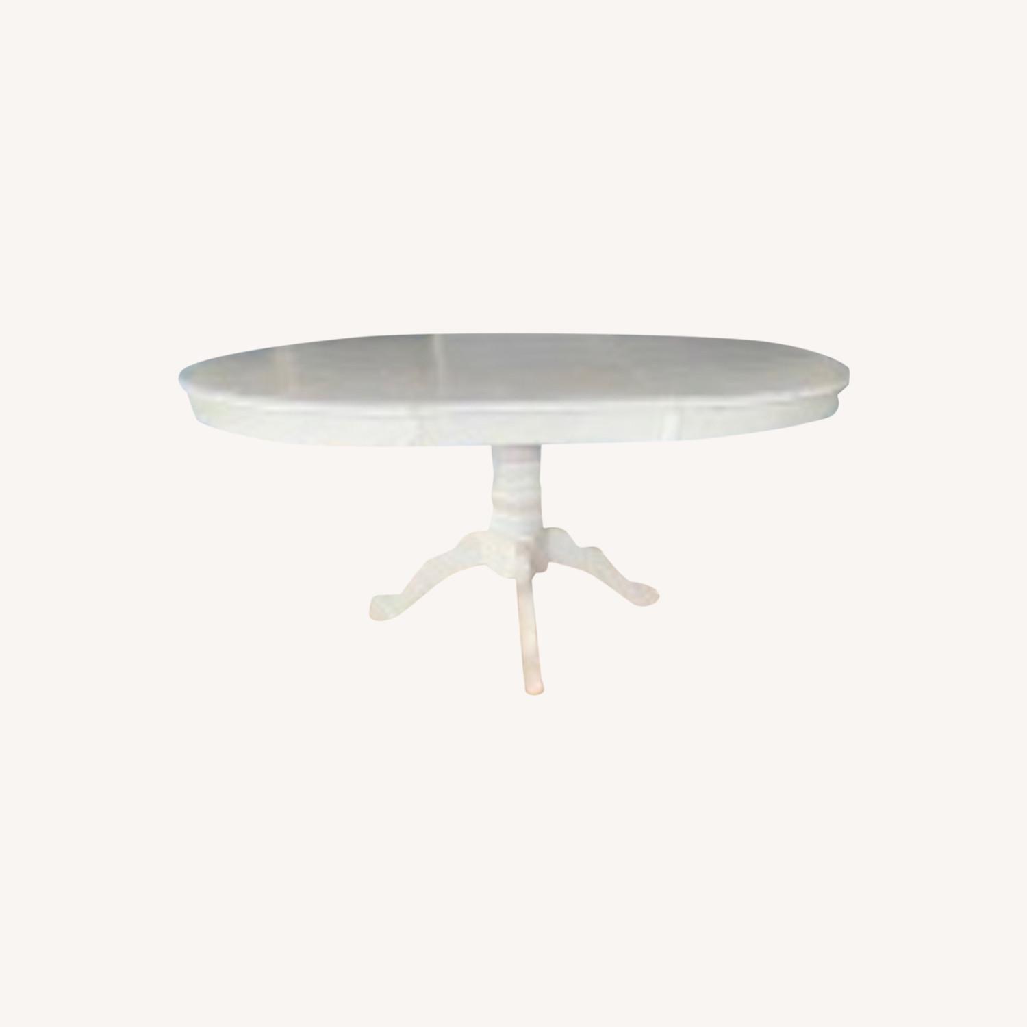 Pier 1 Round White Pedestal Dining Table - AptDeco