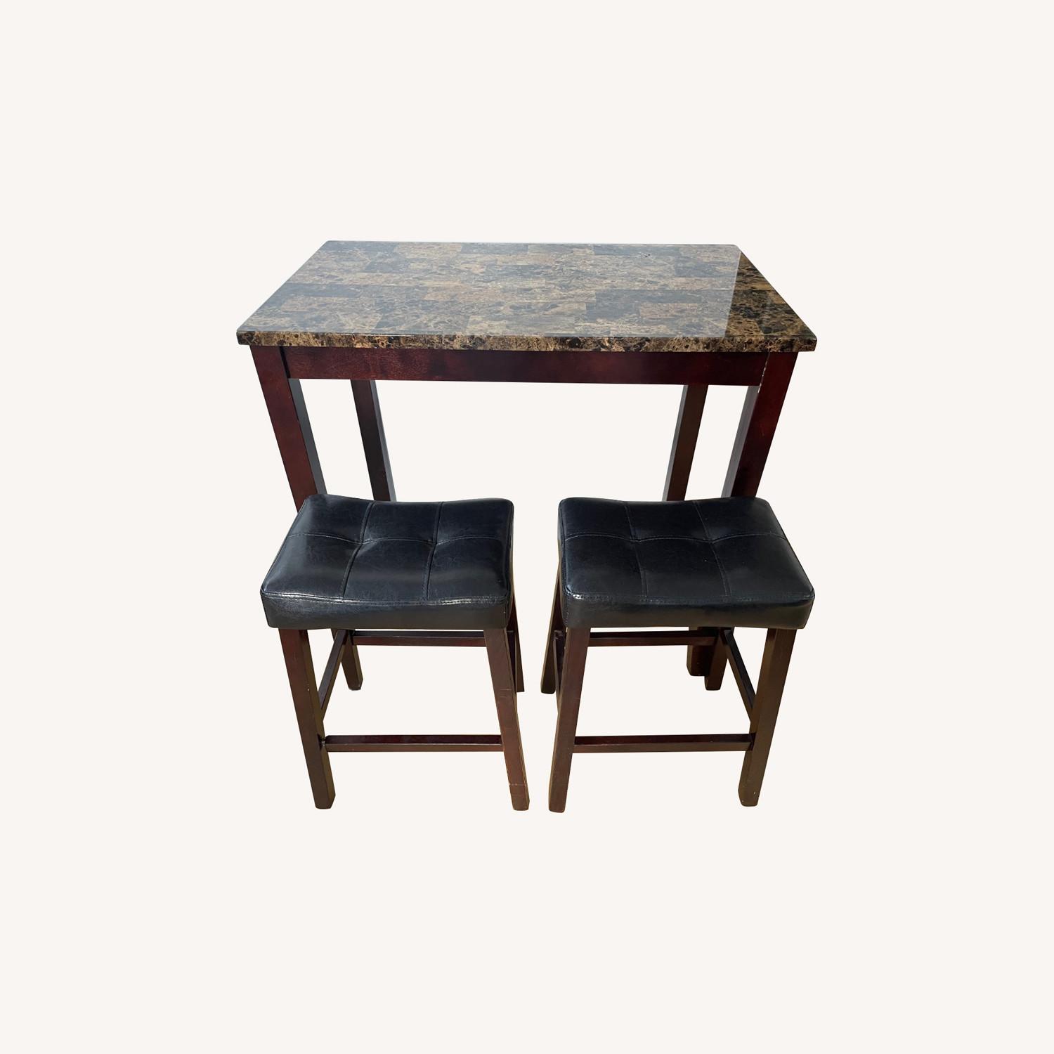 Faux Marble Countertop Table and Two Chairs - AptDeco