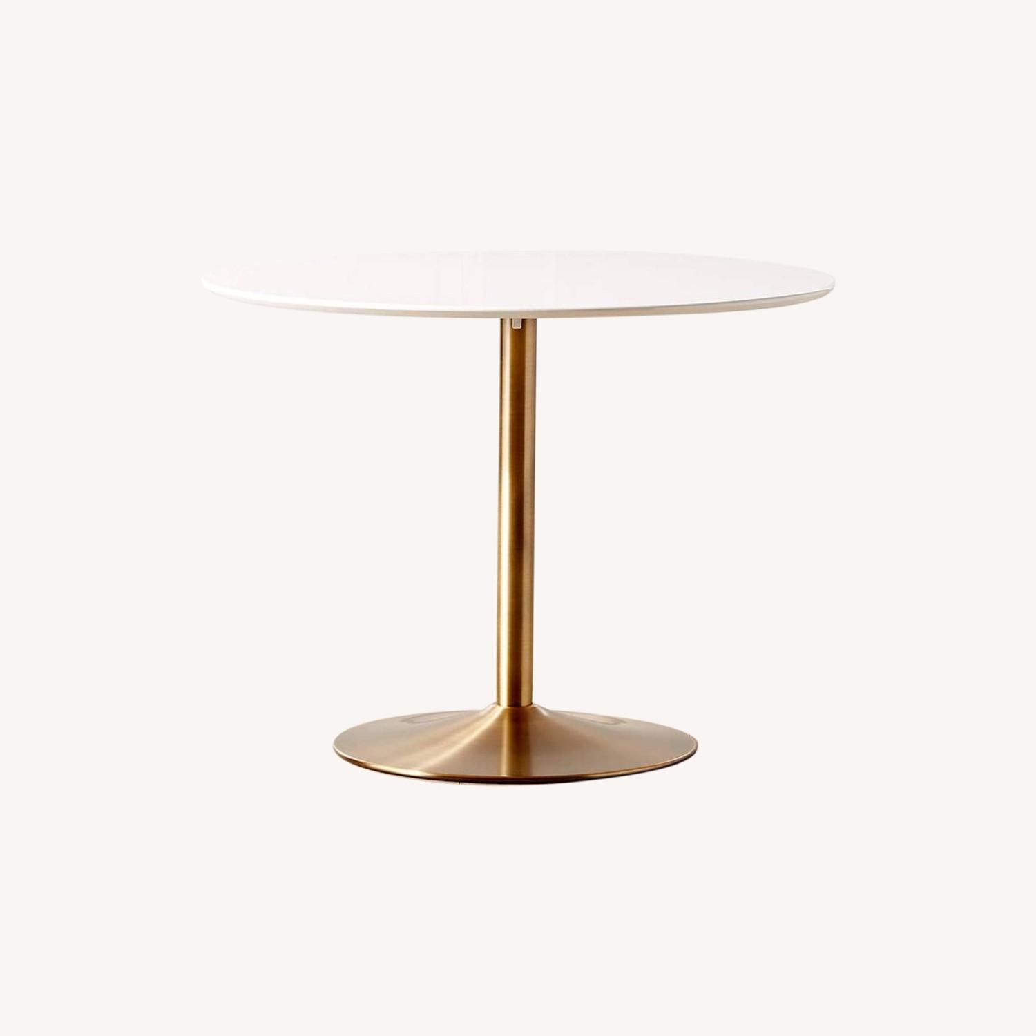 CB2 Round Dining Table - AptDeco