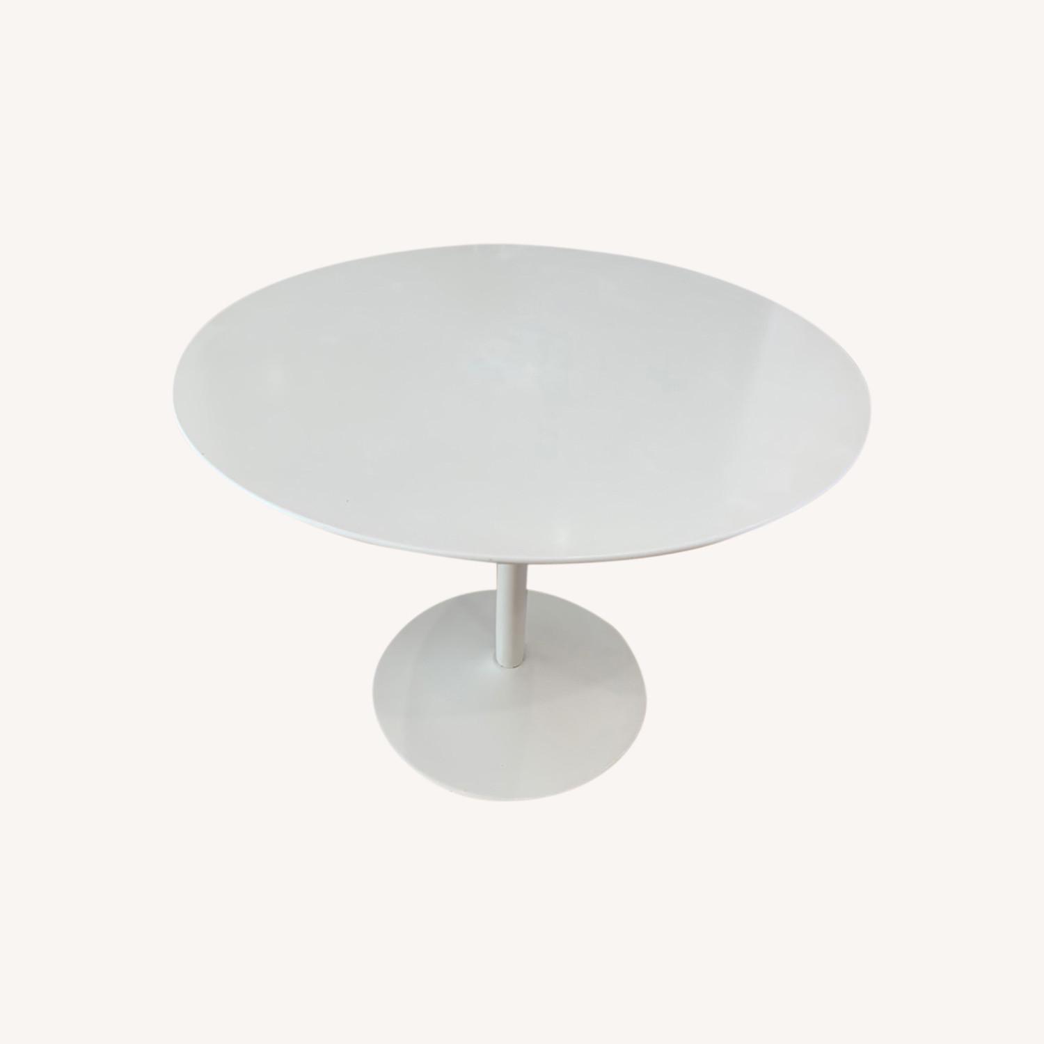 CB2 Odyssey Round White Dining Table - AptDeco