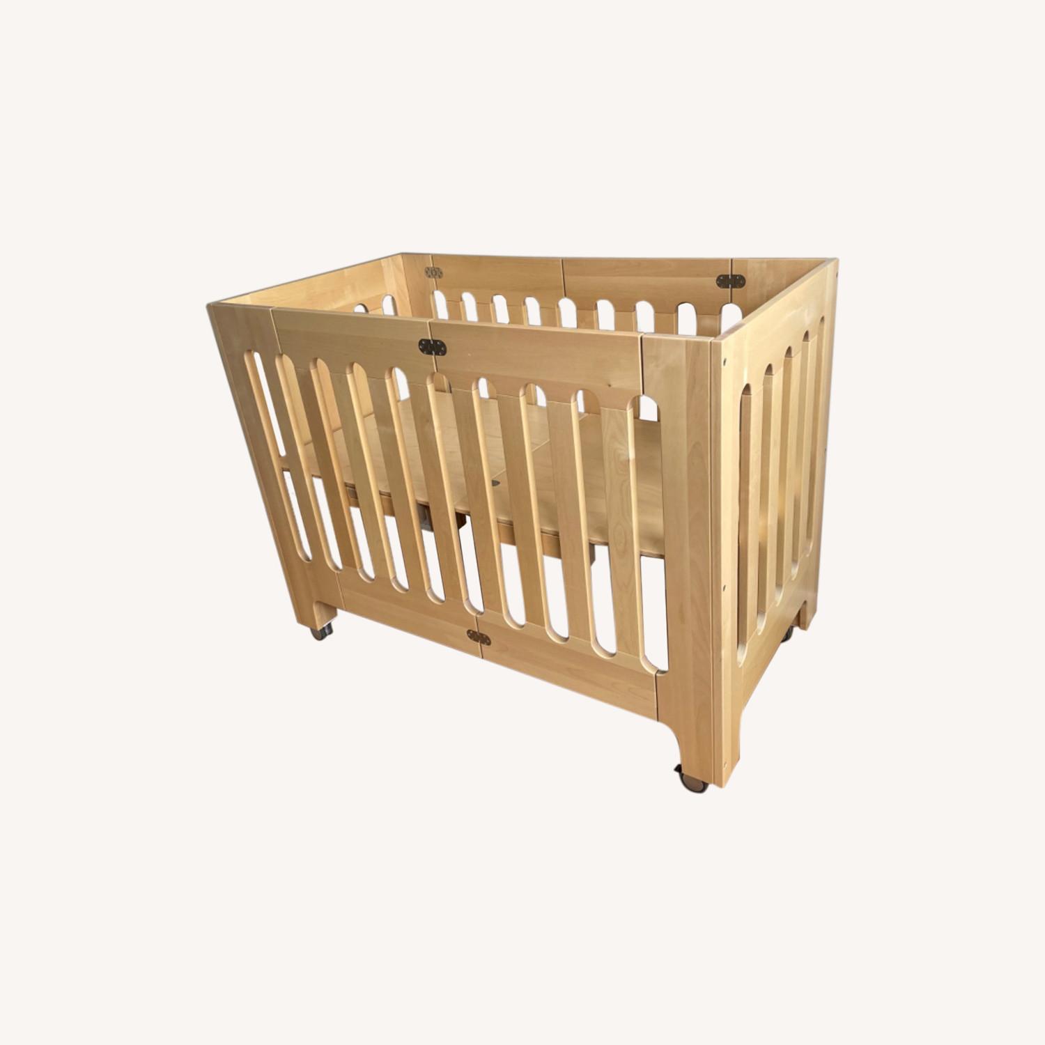Bloom Alma Papa Convertible Folding Crib - AptDeco