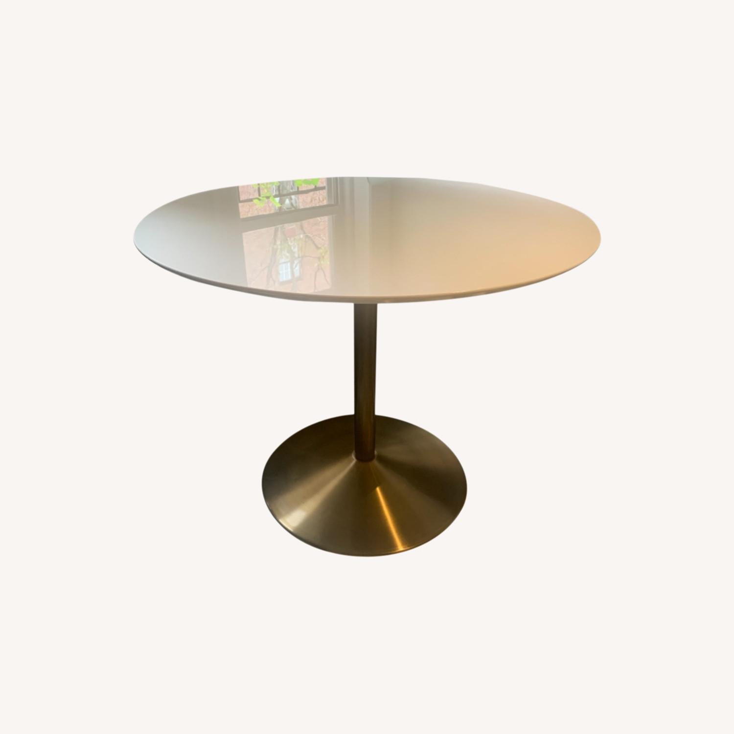 CB2 Round Dining Table - AptDeco