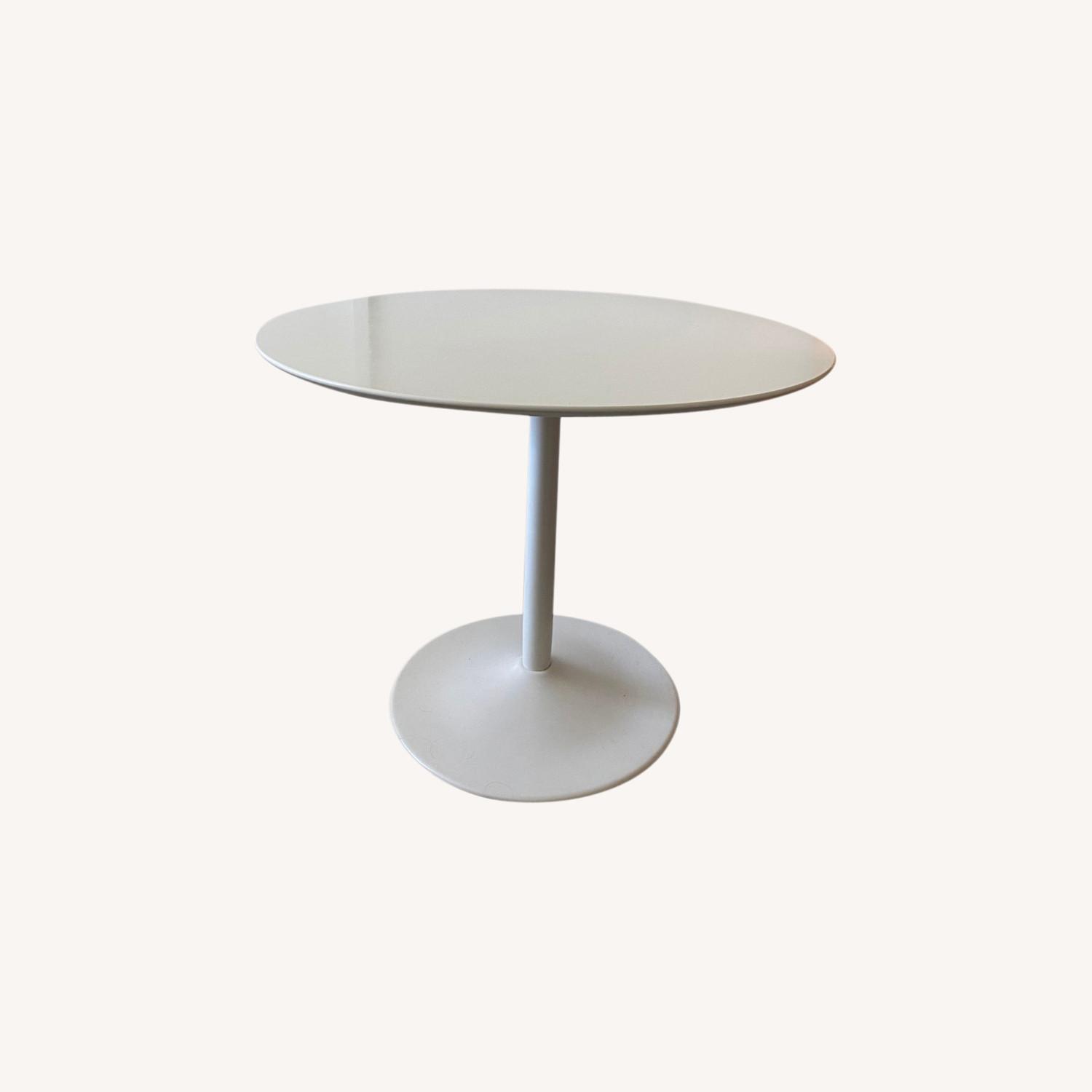 CB2 ODYSSEY White Round Dining Table - AptDeco
