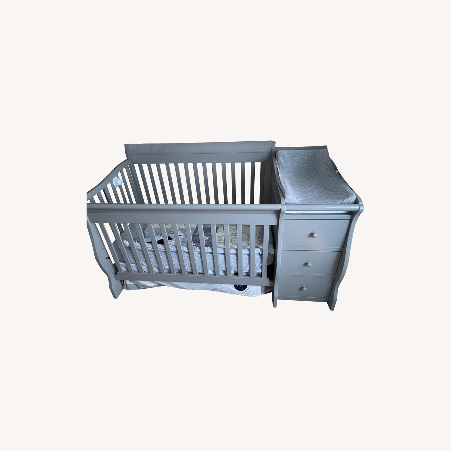 Deltana Baby Crib with Changing Station - AptDeco