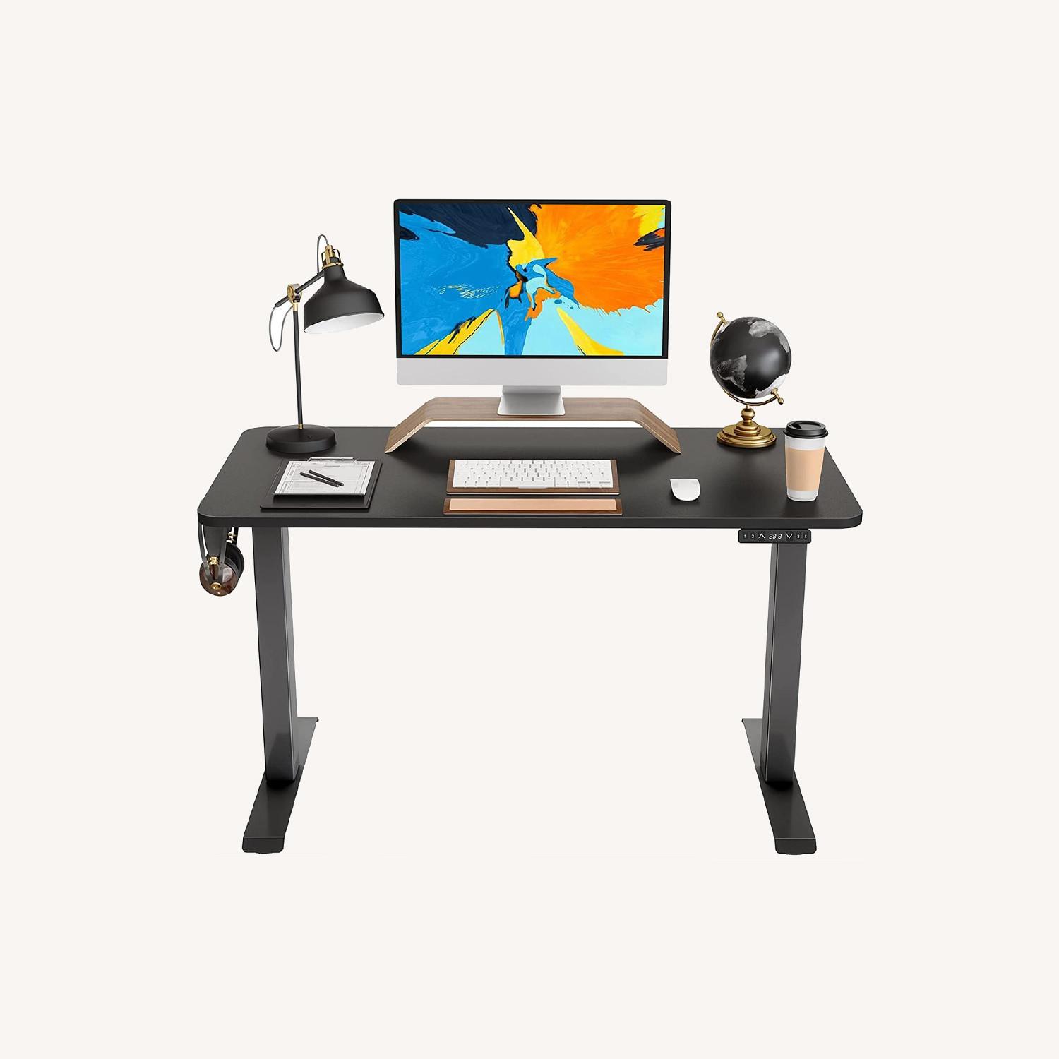 Black Adjustable Height Electric Standing Desk - AptDeco