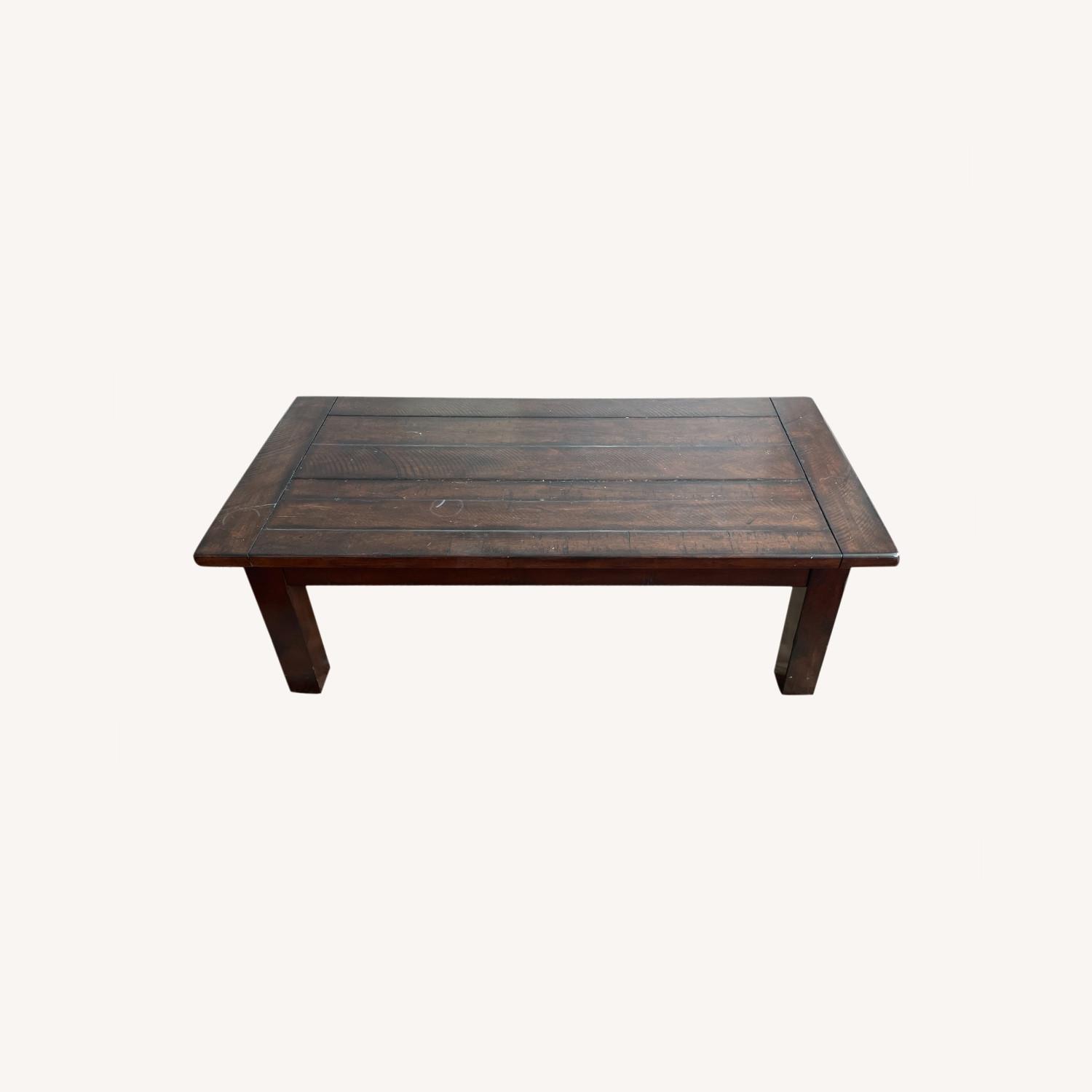Pottery Barn Solid Wood Coffee Table - AptDeco