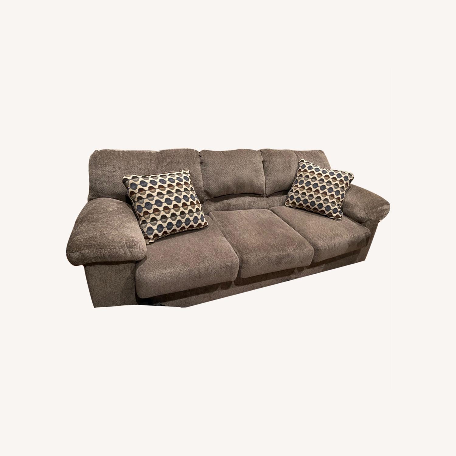 Three Seater Sofa with two Throw Pillows - AptDeco