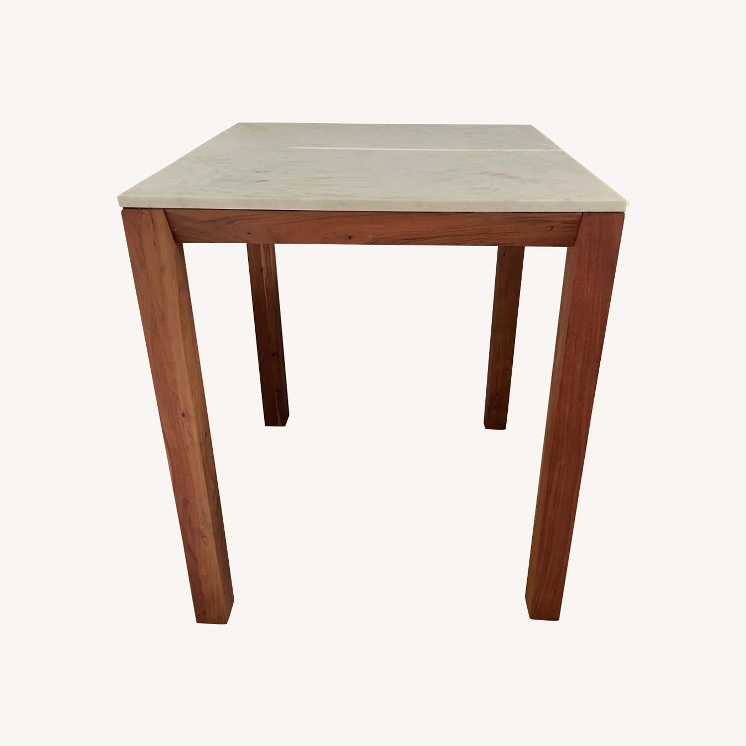 CB2 Marble Tall Dining Table AptDeco cb2-marble-tall-dining-table-aptdeco