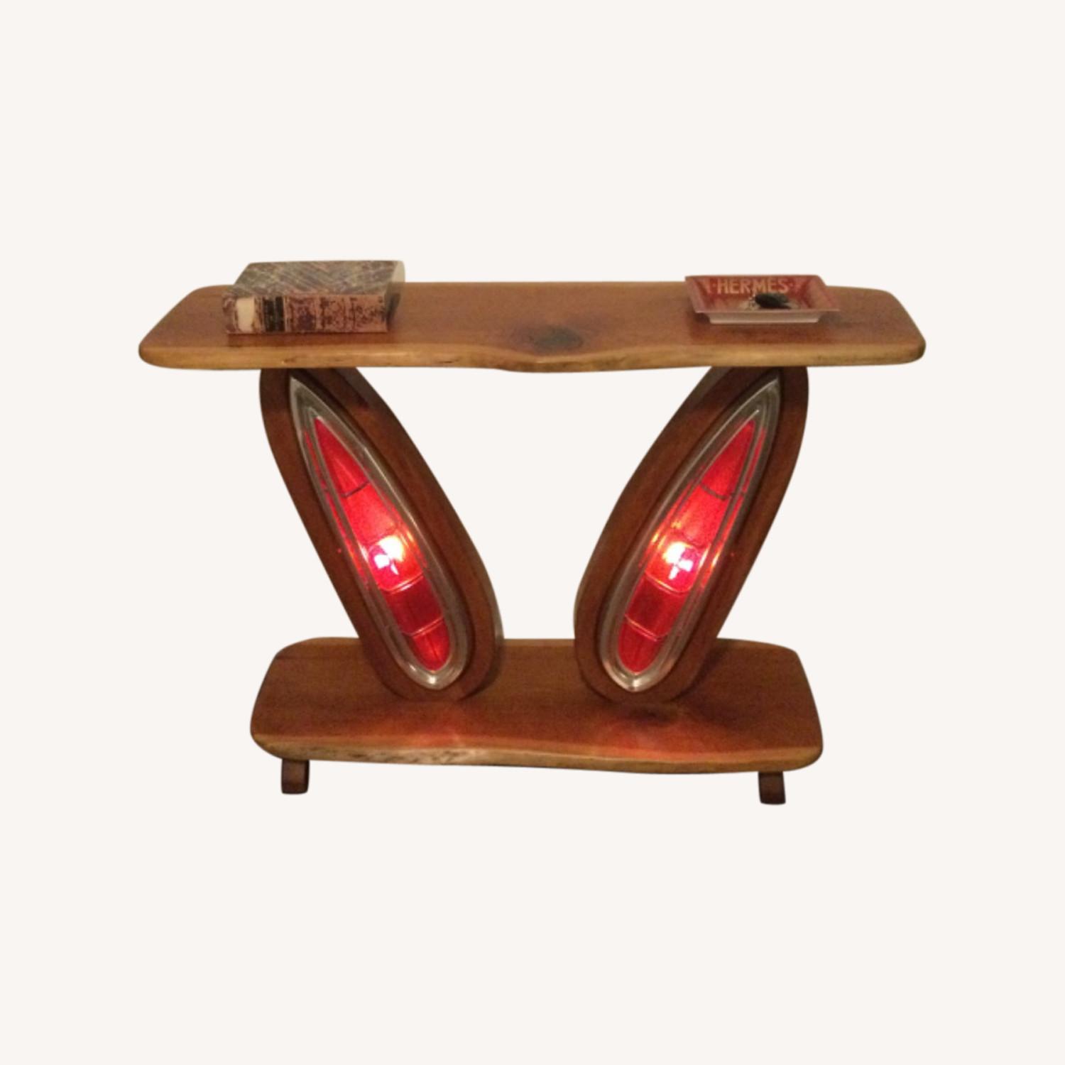 Entry Table with Vintage Automobile Lights - AptDeco