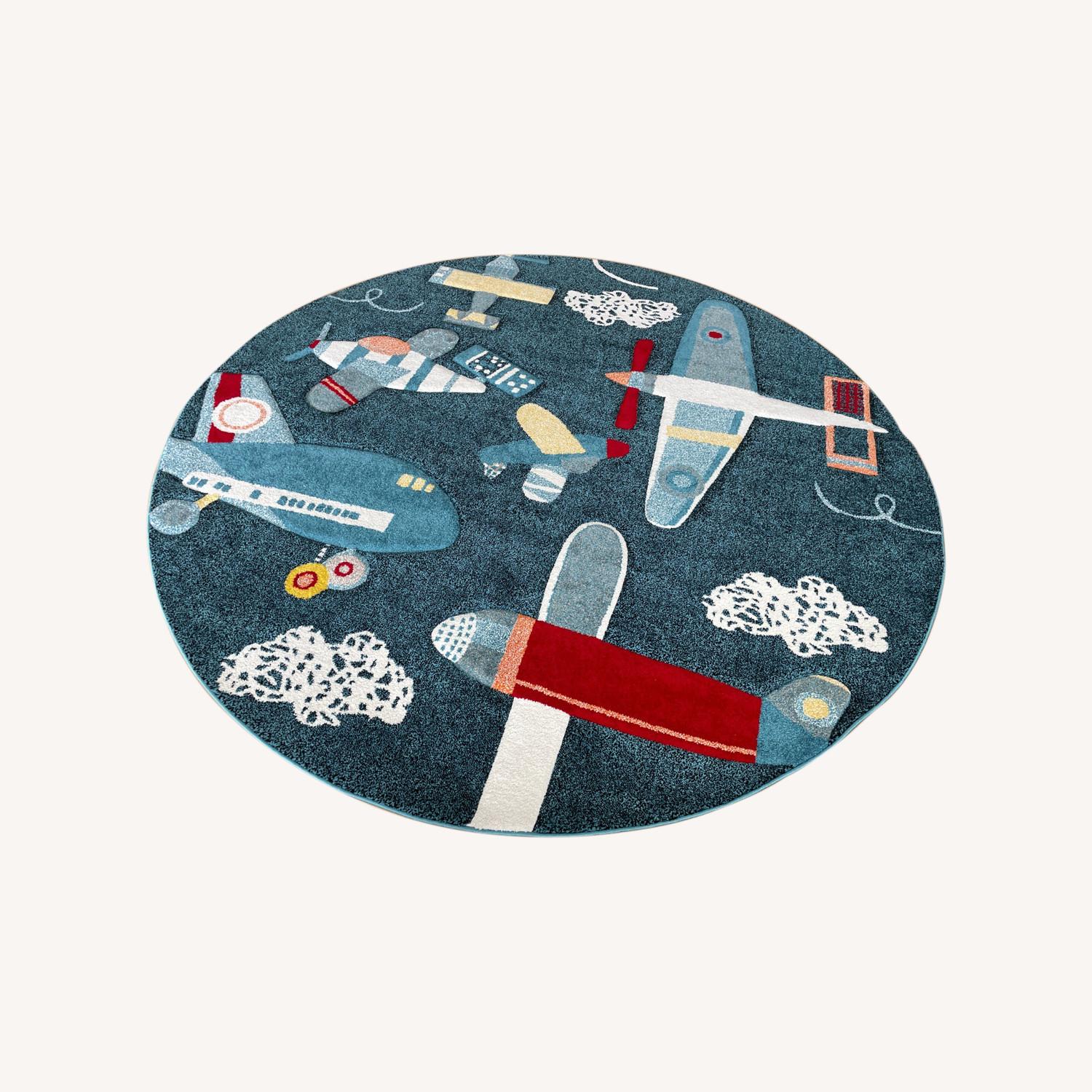 Round Navy Airplane Children's Area Rug - AptDeco