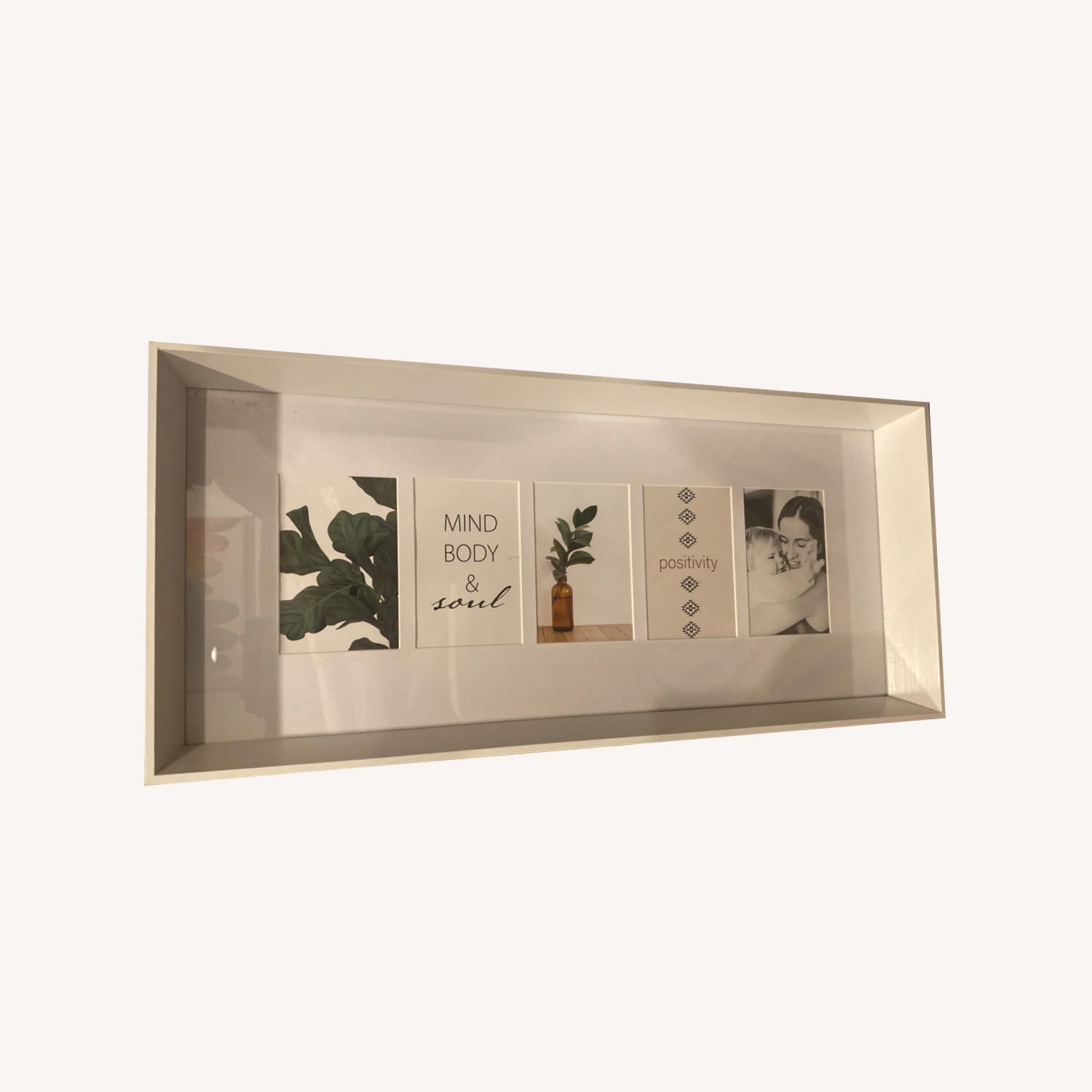 White Pro Tire Frame that holds 5 Photos - AptDeco