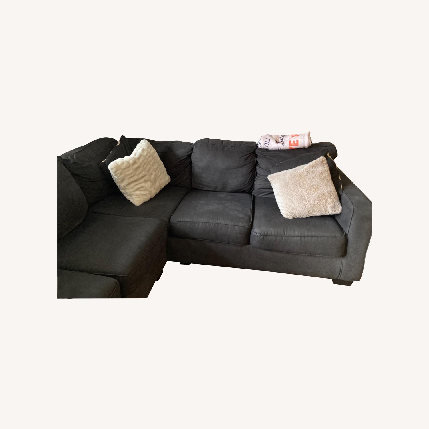 Jennifer Convertibles Gray Fabric Sectional Sofa + 3 Pillows - AptDeco