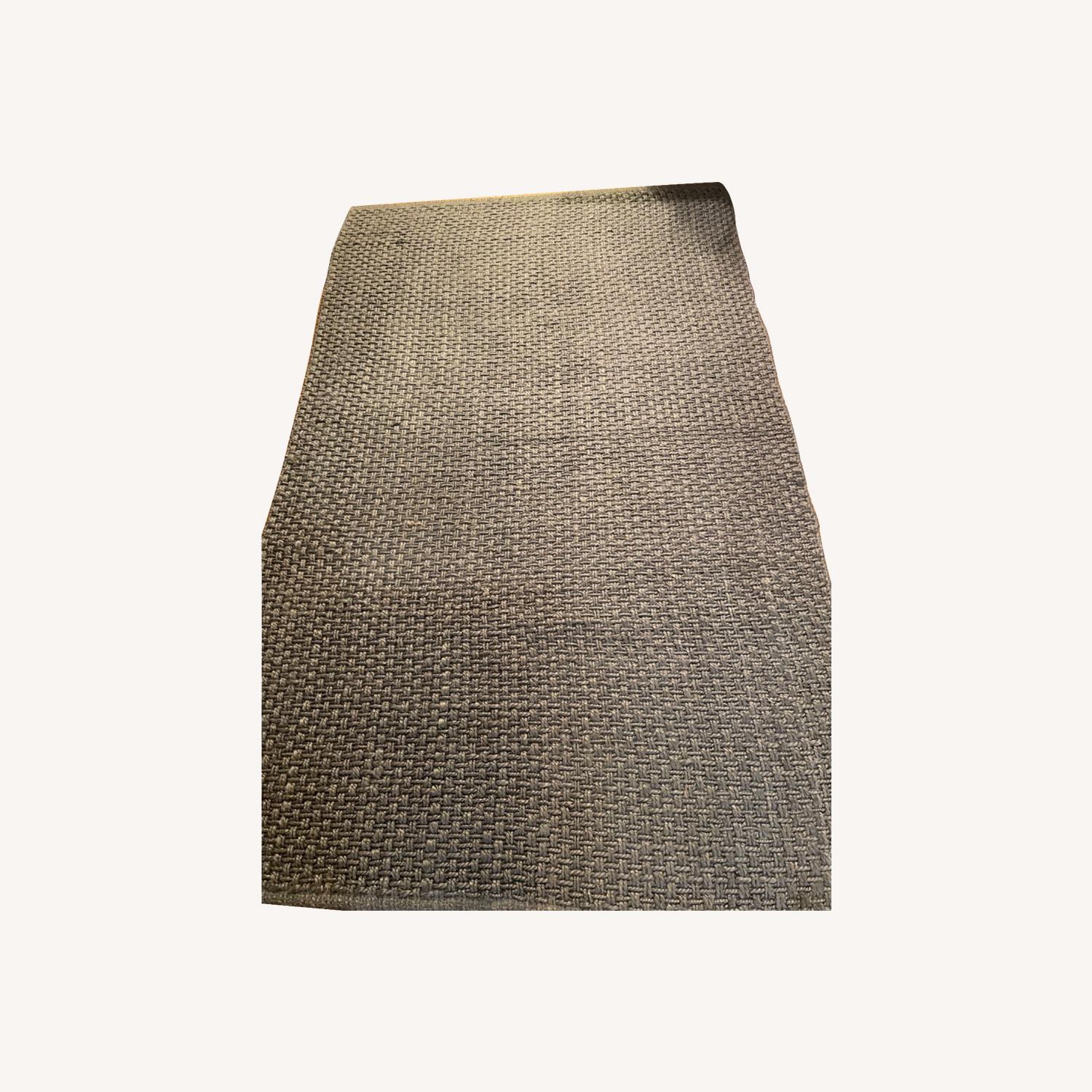 Crate & Barrel Grey Jute 5x8 Rug and Pad - AptDeco