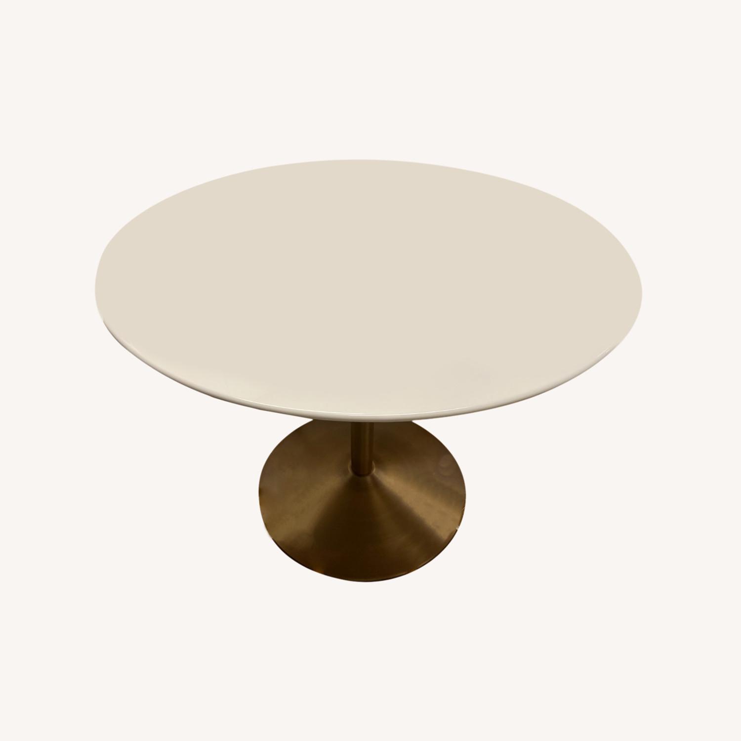 CB2 Odyssey Brass Round White Dining Table - AptDeco
