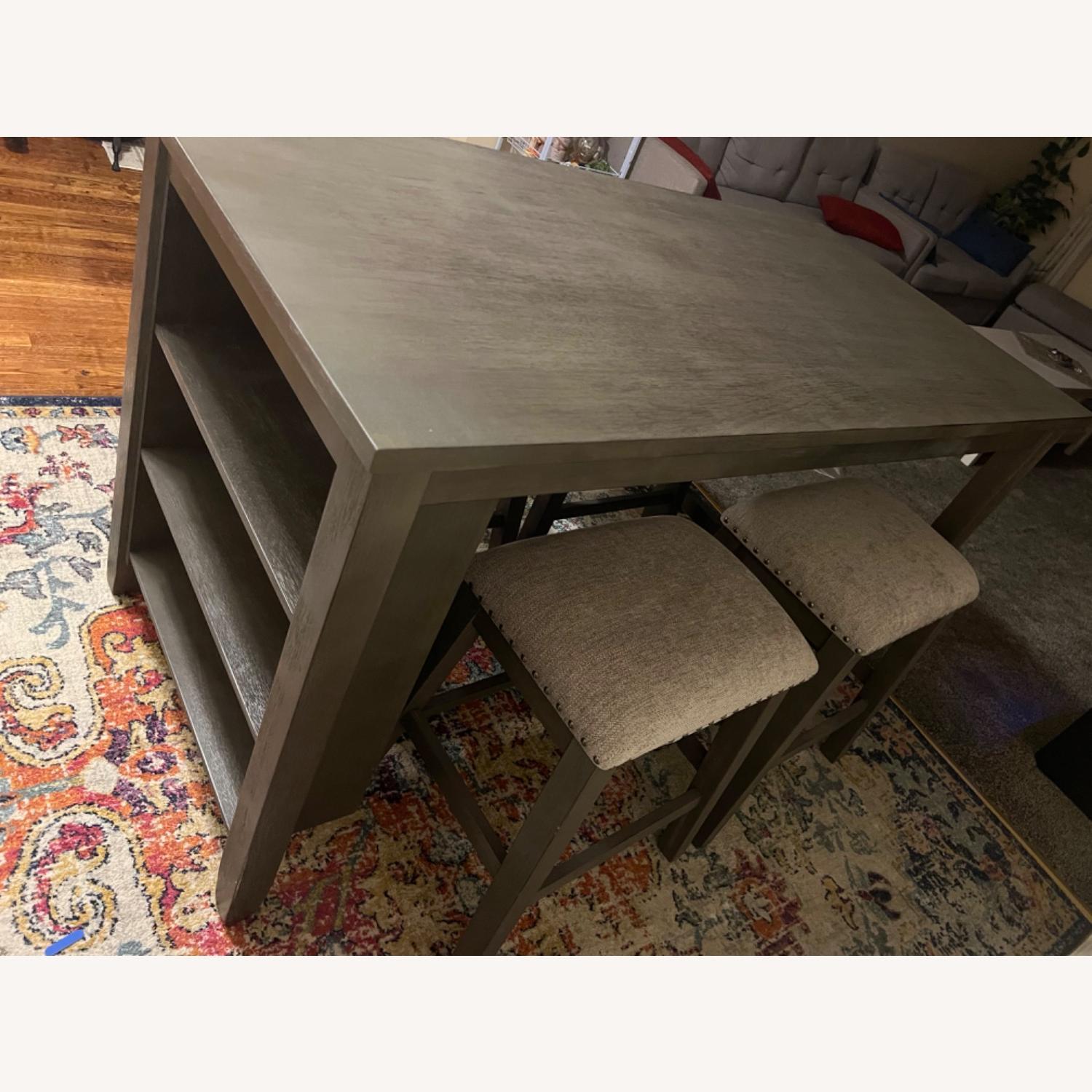 Raymour & Flanigan Dining Table - AptDeco