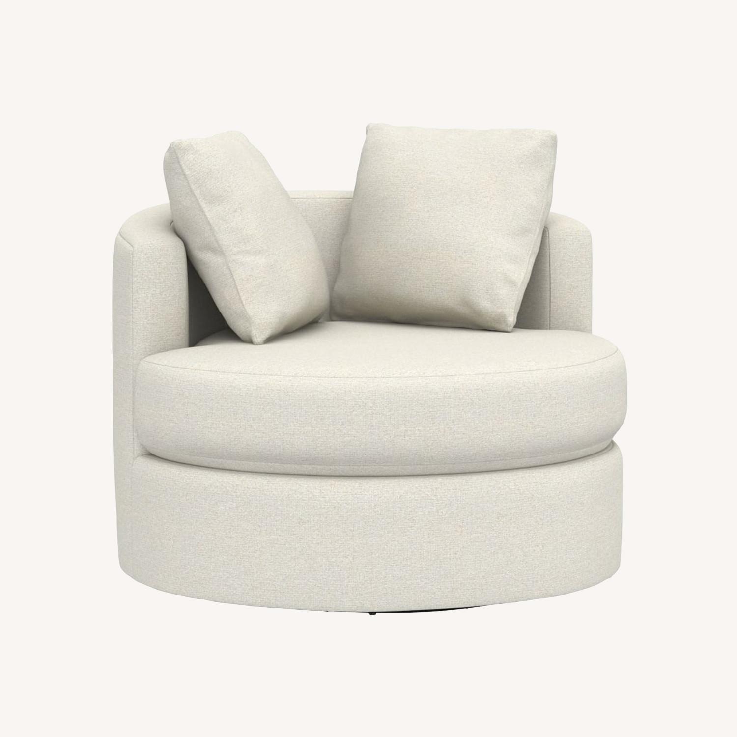 Pottery Barn Balboa Upholstered Swivel Armchair Aptdeco