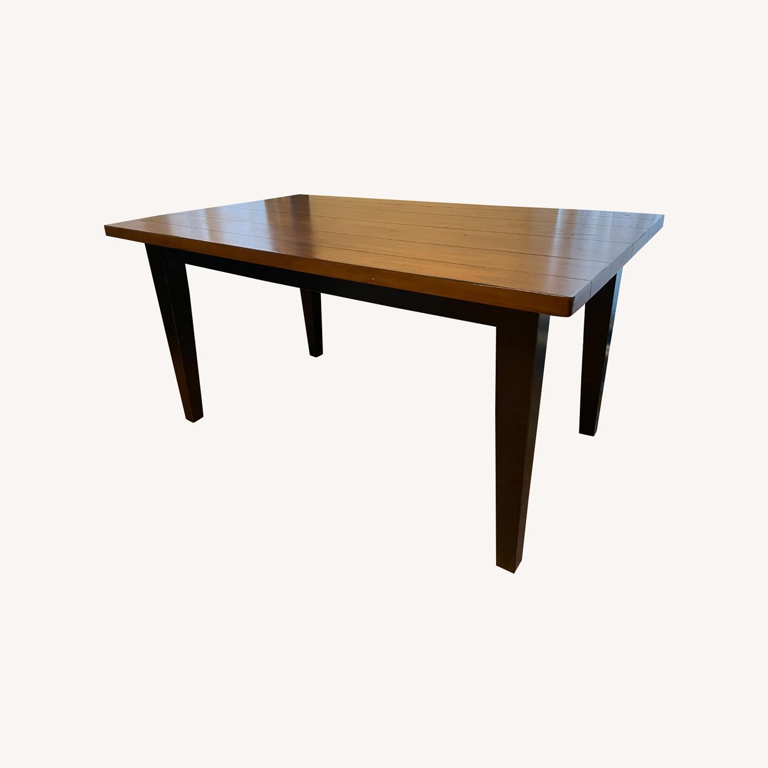 Pier 1 Imports Solid Wood Rectangular Dining Table - AptDeco