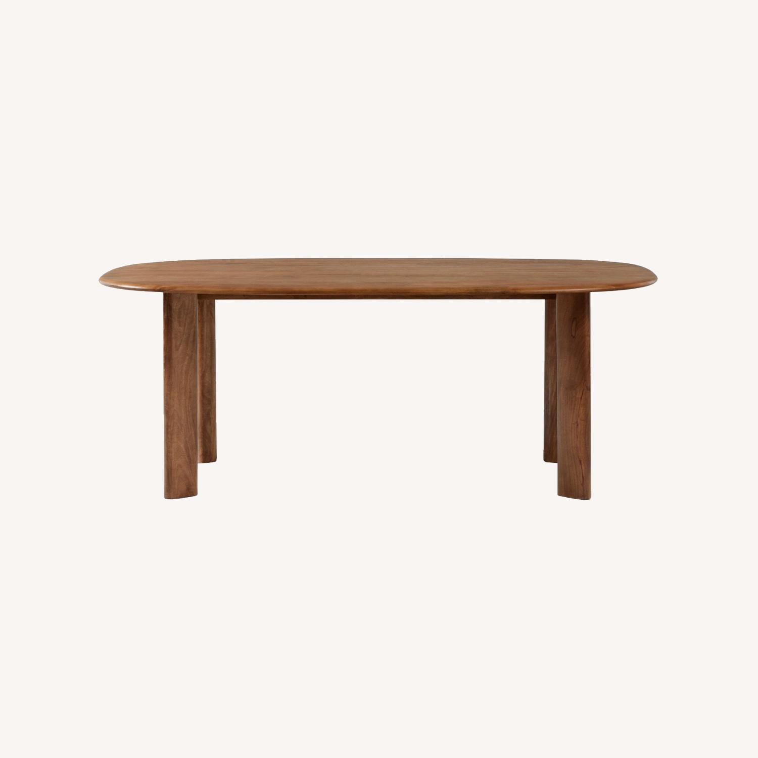West Elm Anton Solid Wood Oval Dining Table 78" - AptDeco