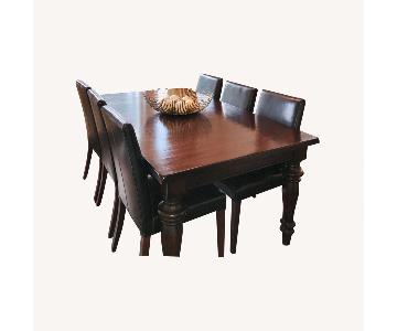 Pottery Barn Solid Wood Dining Table - AptDeco