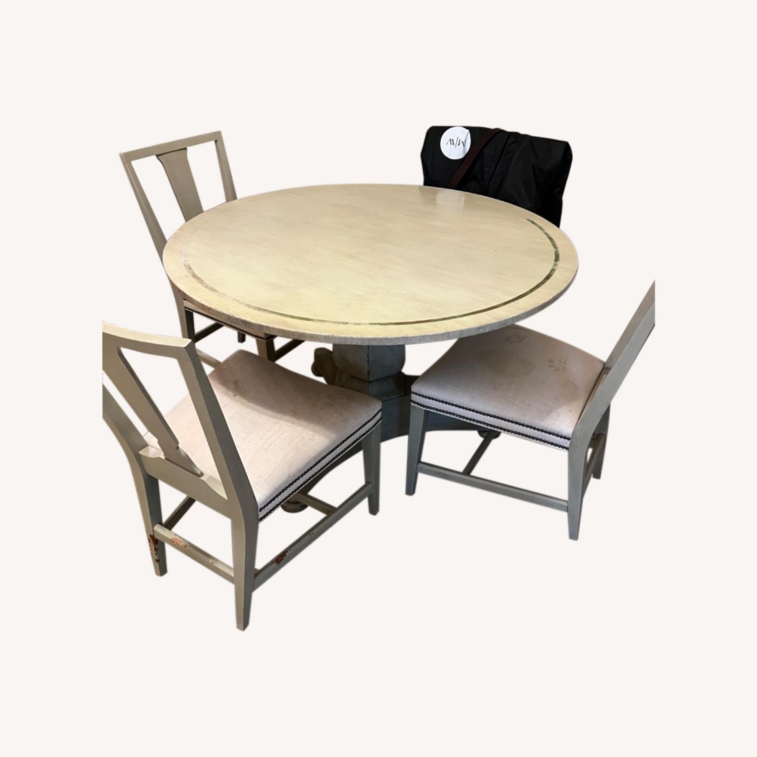 Modern History Circle Dining Room Table - AptDeco