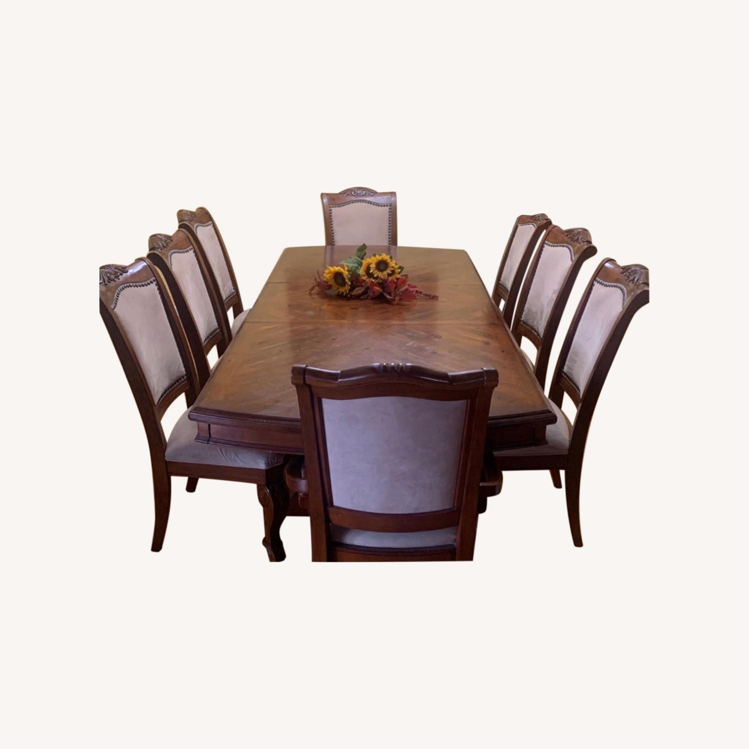 Raymour & Flannigan Dark Brown Dining Table - AptDeco