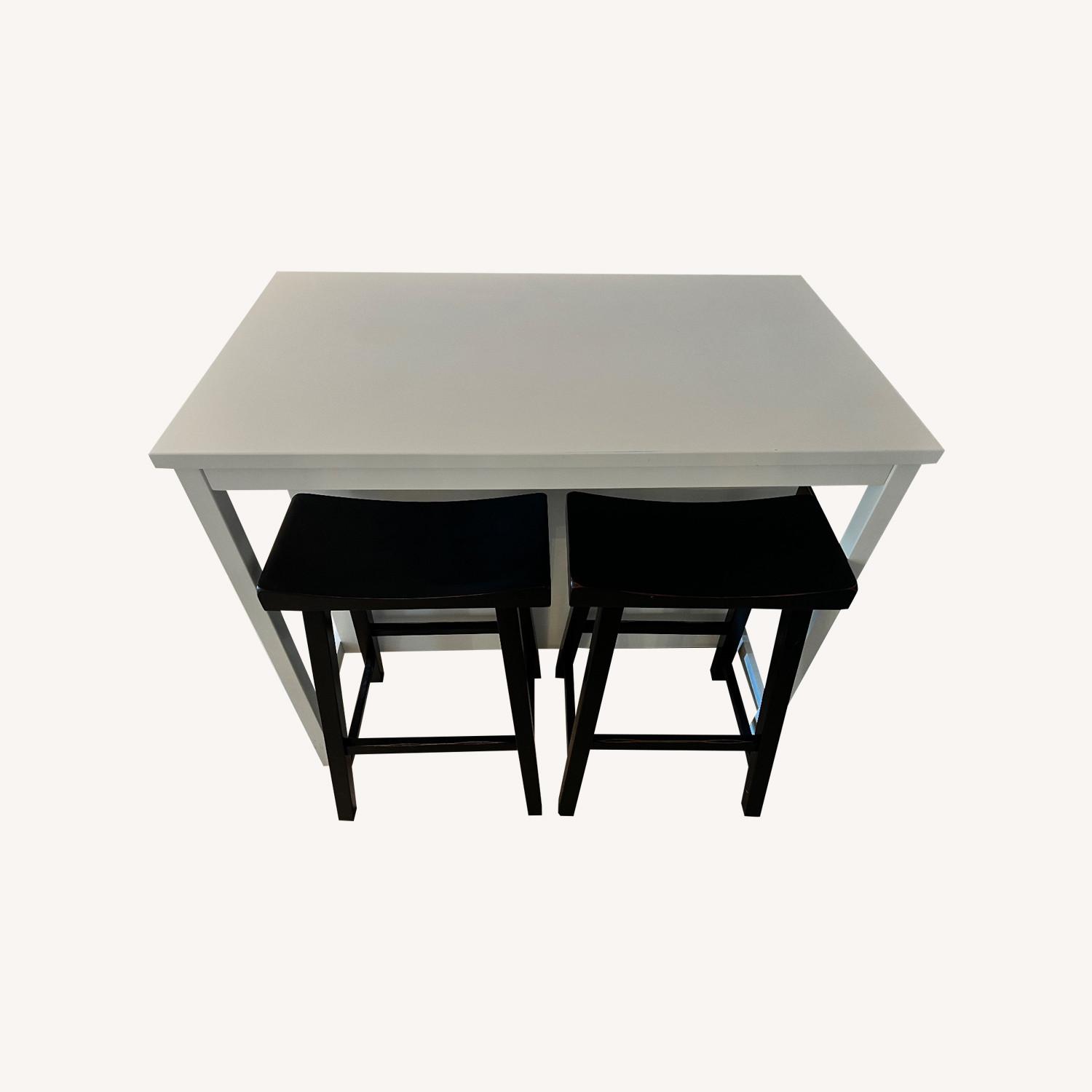 Drake Kitchen Island & two Tibetan Counter Stools - AptDeco