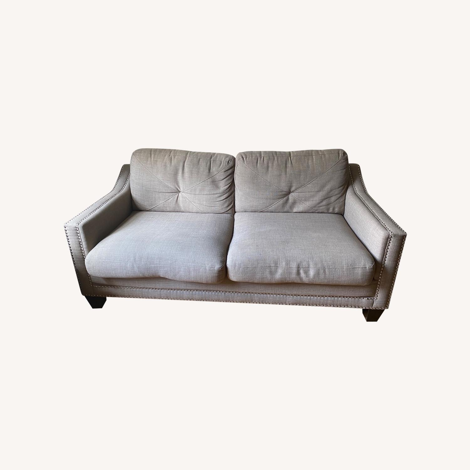 Bob's Discount Furniture Comfy Tan Sofa - AptDeco