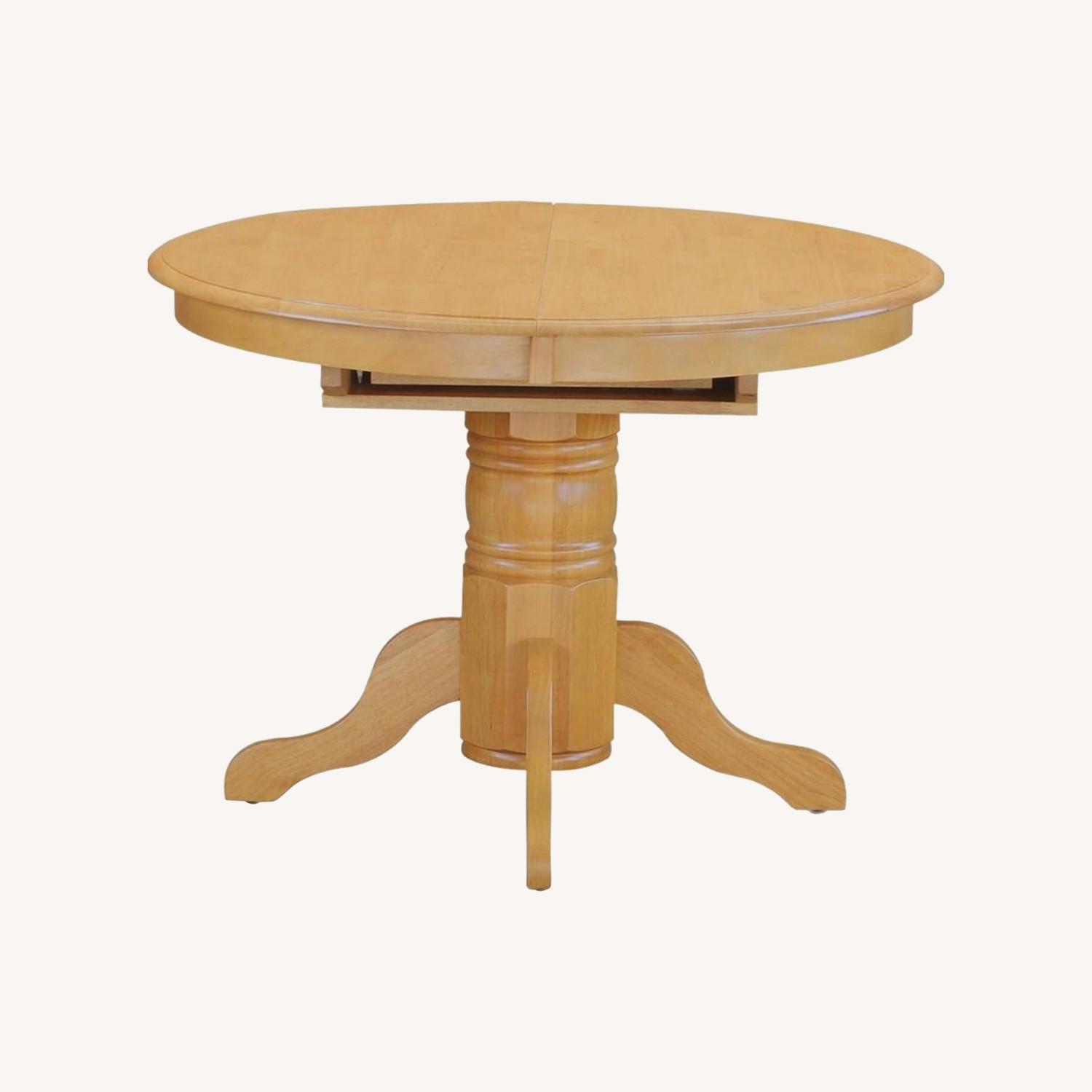 Expandable 42" Round Pedestal Dining Table w Leaf - AptDeco