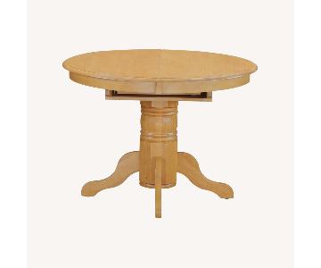 Expandable 42" Round Pedestal Dining Table w Leaf - AptDeco