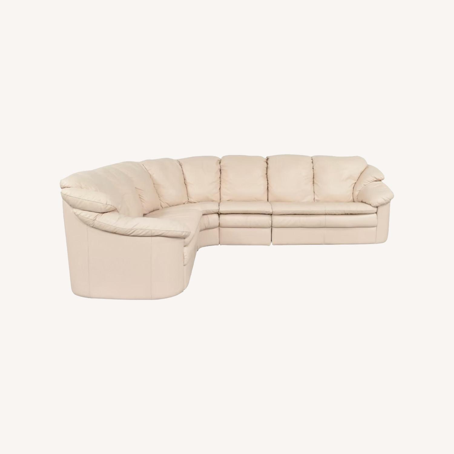 Used natuzzi leather sectional store