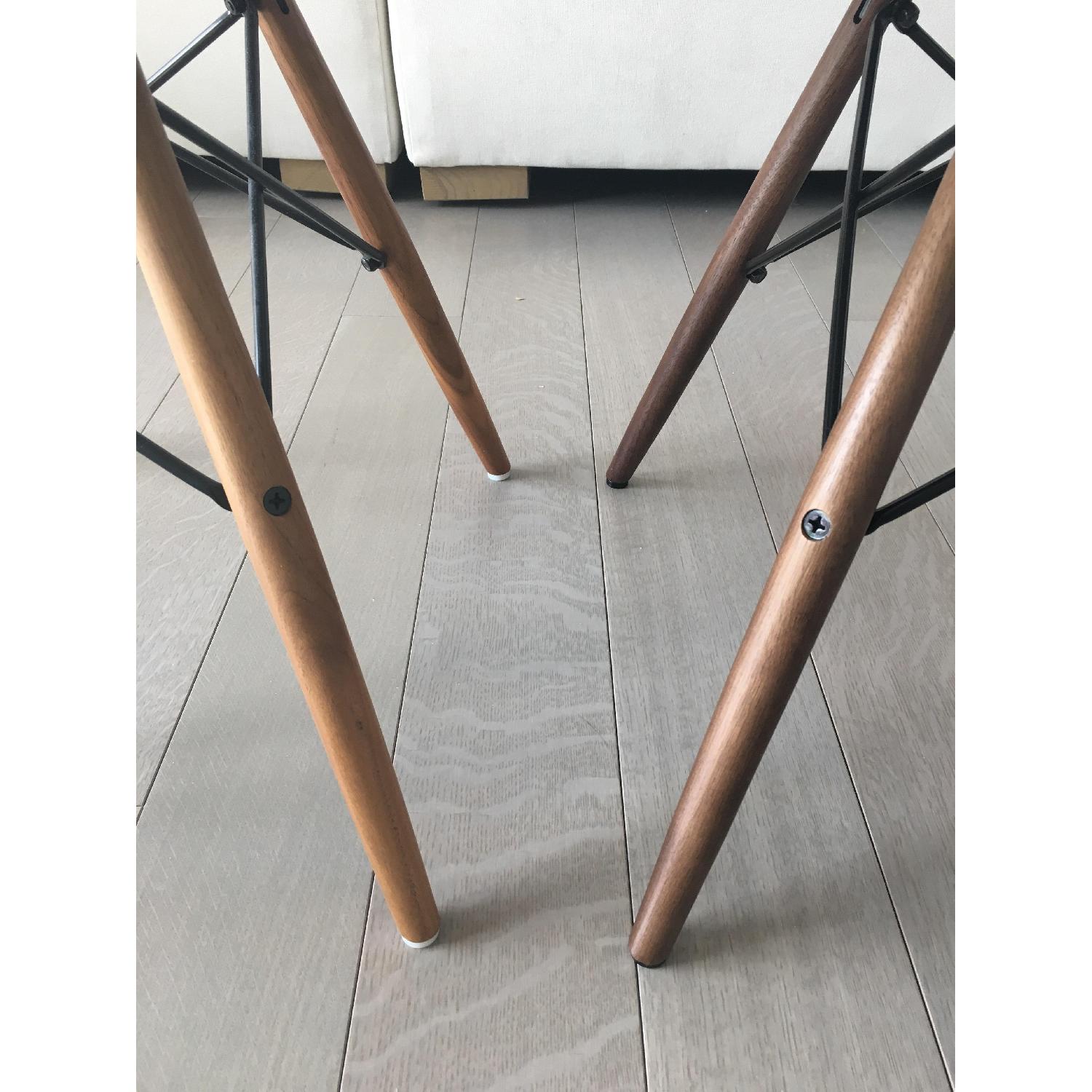 Eames Molded Plastic Dowel-Leg Side Chairs - AptDeco