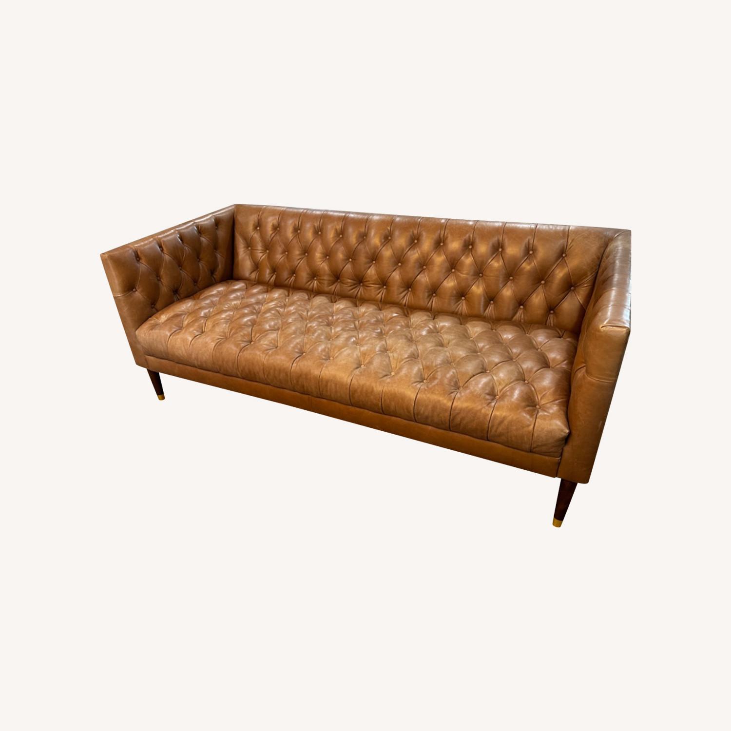 Crate and Barrel Tufted Leather Couch - AptDeco