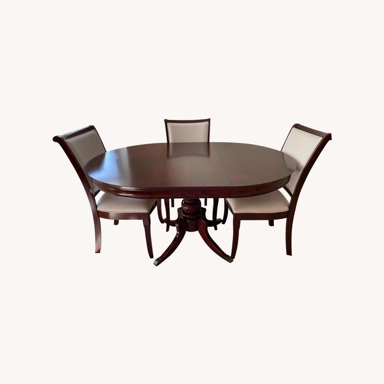Round Cherry Dining Table with 4 Chairs - AptDeco