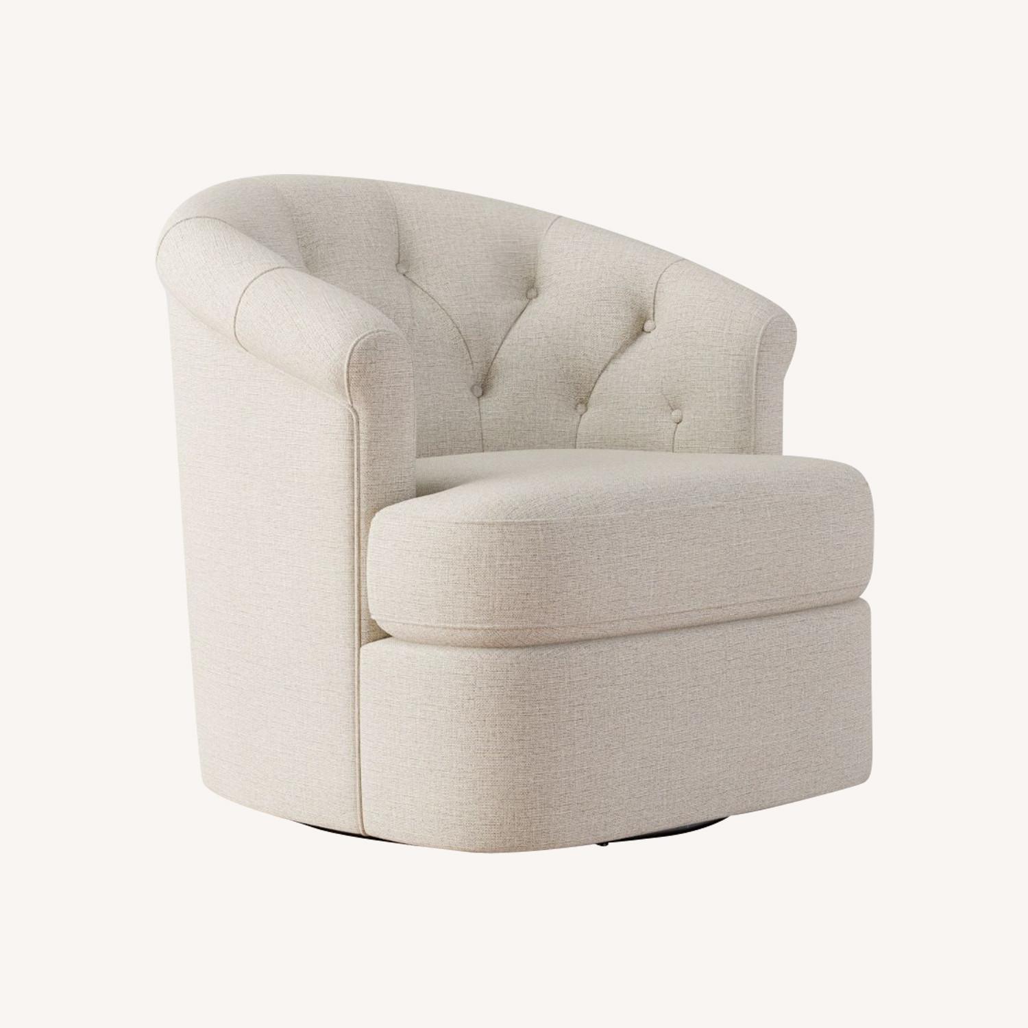 Pottery Barn Sutton Tufted Swivel Chair - AptDeco
