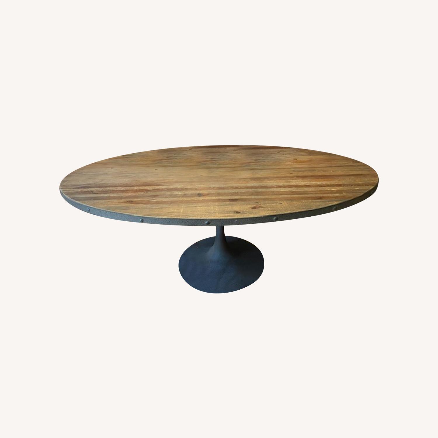 Stylish Pedestal Dining Table with a Rustic Vibe - AptDeco