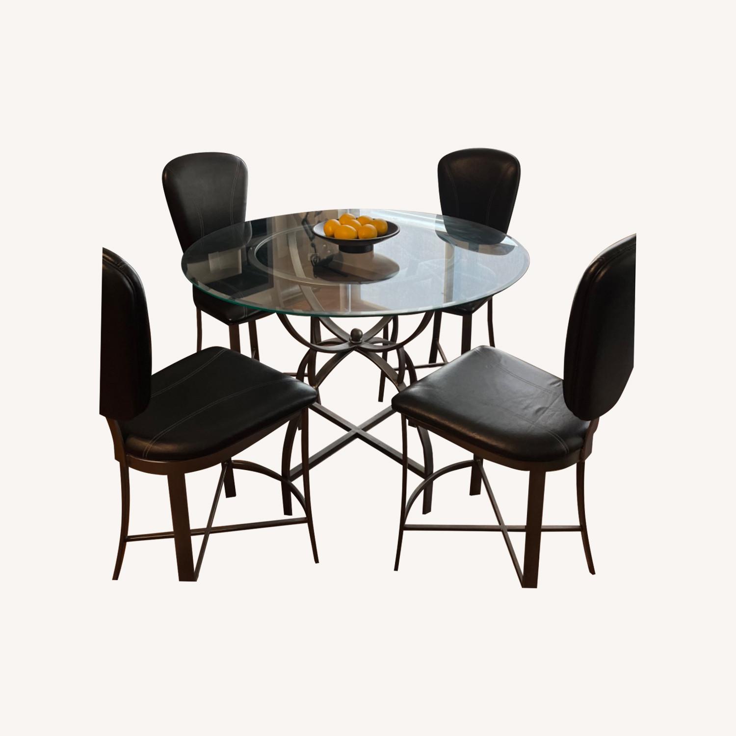 Circle Glass Dining Table with 4 Leather Chairs - AptDeco