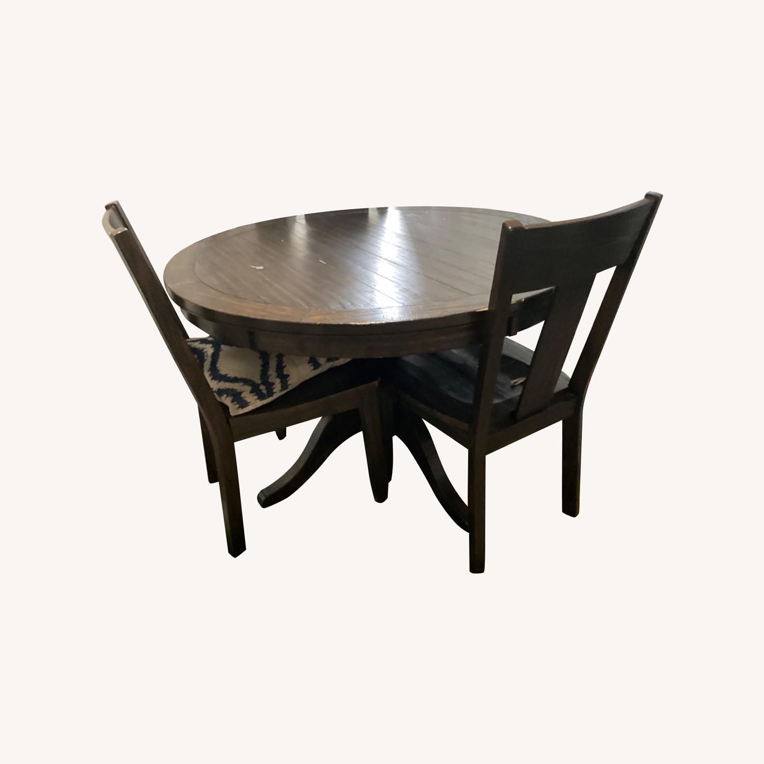 Ashley Circle Dining Table - AptDeco