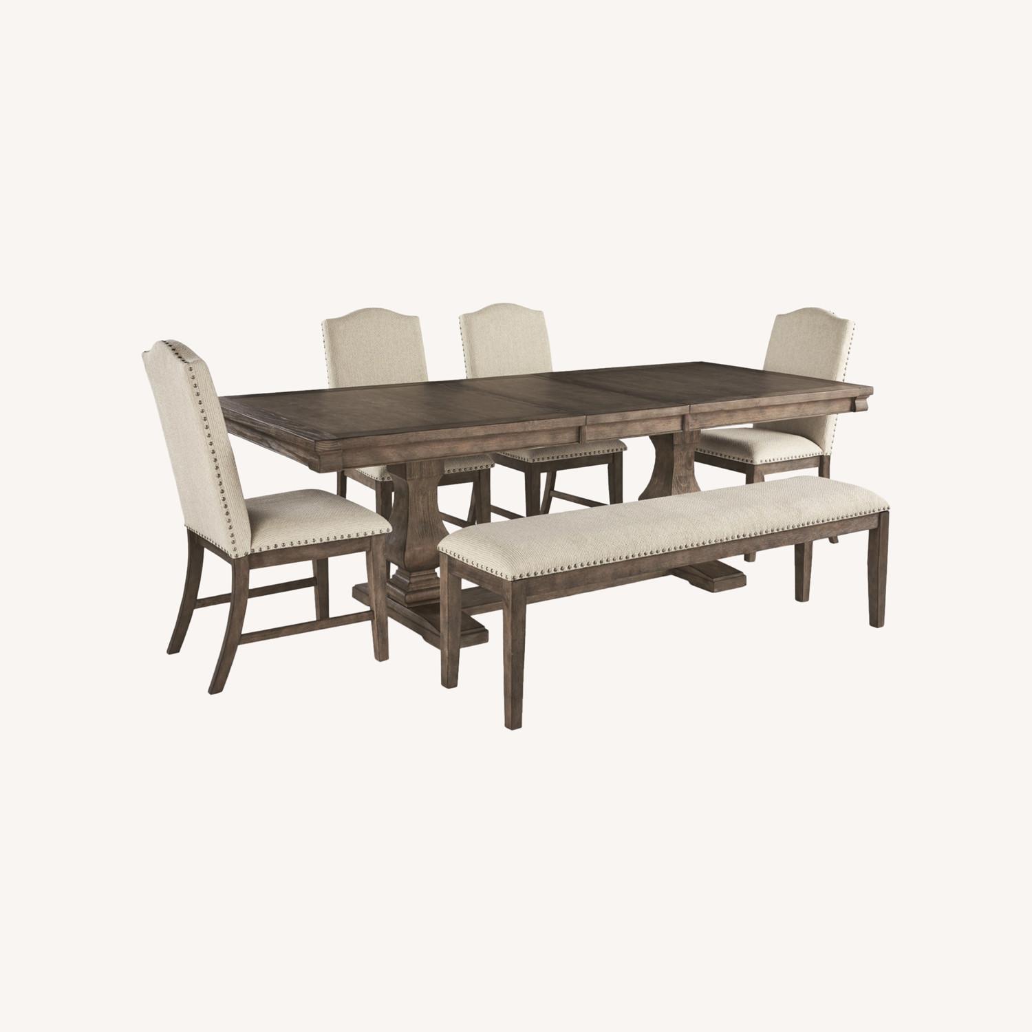 Ashley Furniture Johnelle Dining Table and 4 Chairs and Bench - AptDeco