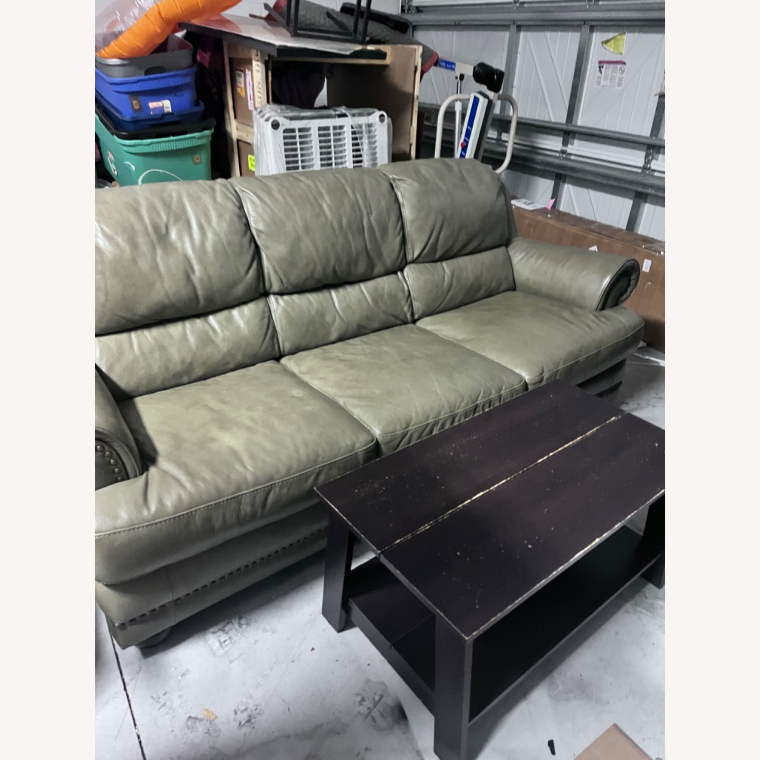 Comfortable Green Leather Sofa - AptDeco