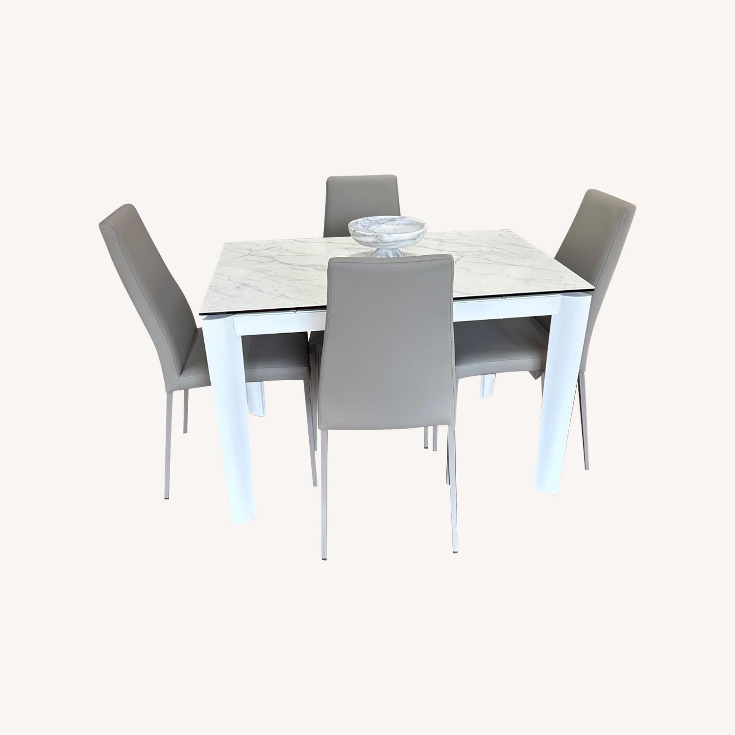 Calligaris Dining Table, 4 Chairs and Centerpiece - AptDeco