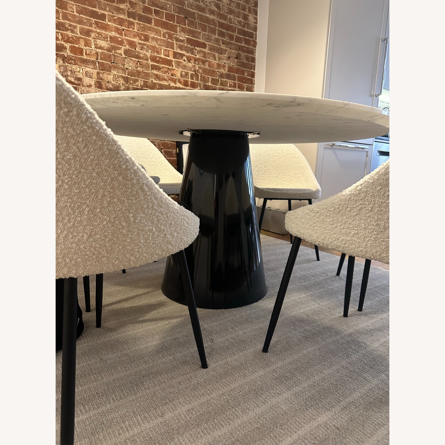 Decker 54" Round Dining Table - AptDeco