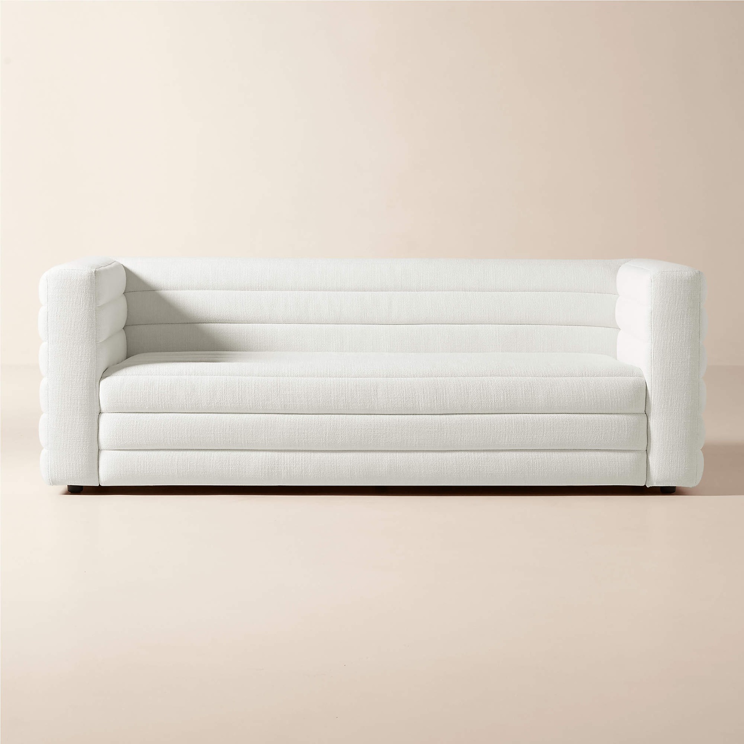 CB2 Channeled Ivory sofa - AptDeco