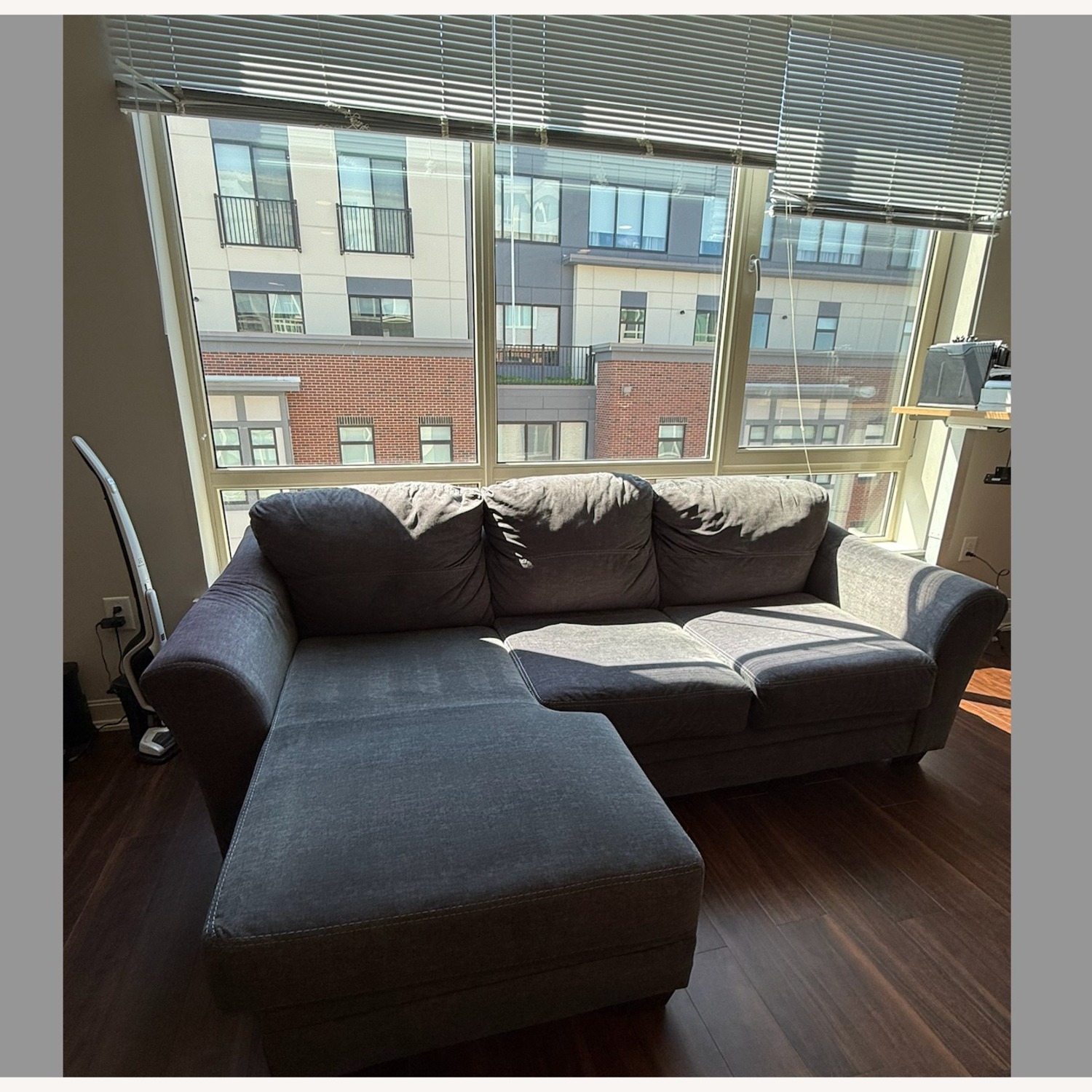 Ashley Furniture Extremely Comfortable Gray Couch - AptDeco