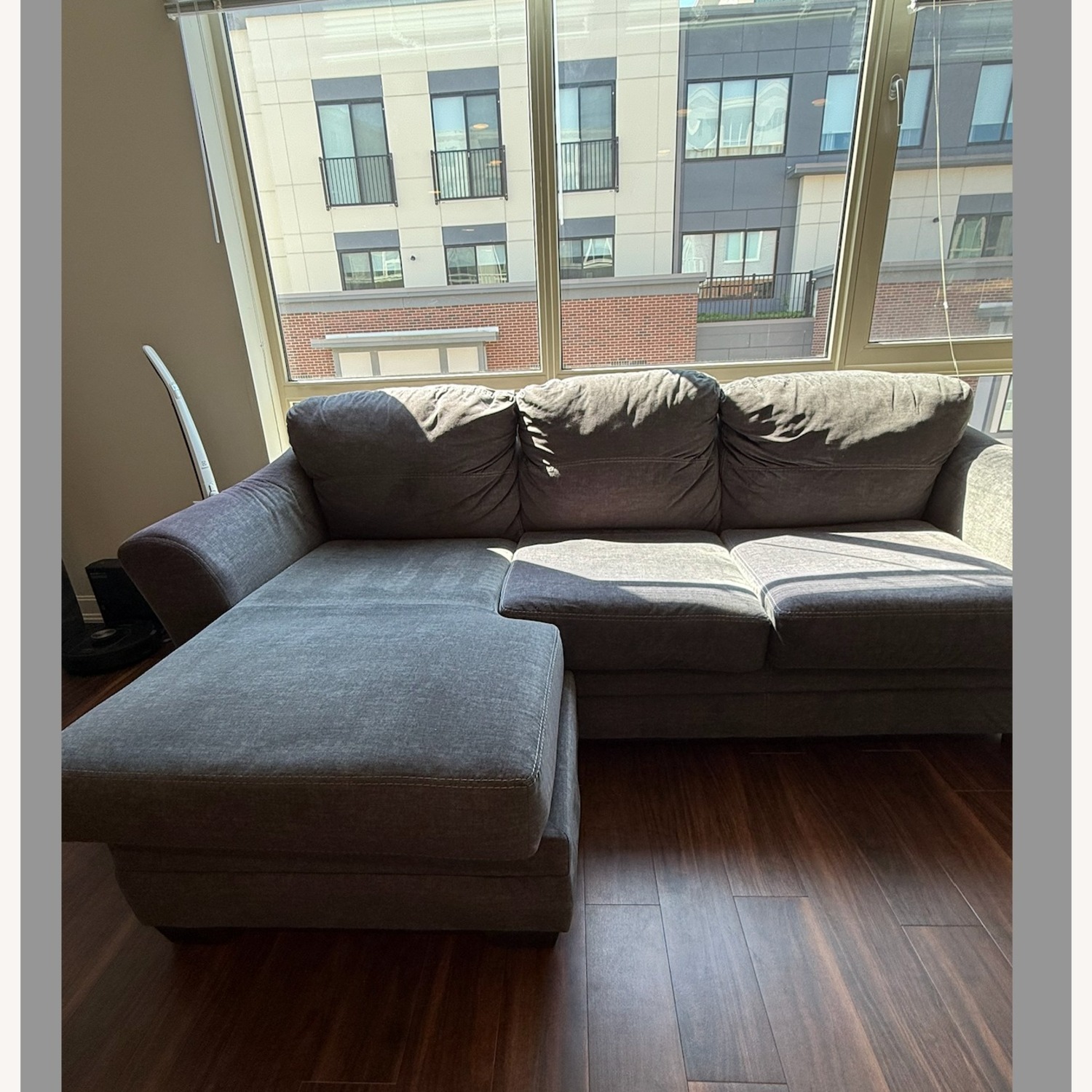 Ashley Furniture Extremely Comfortable Gray Couch - AptDeco
