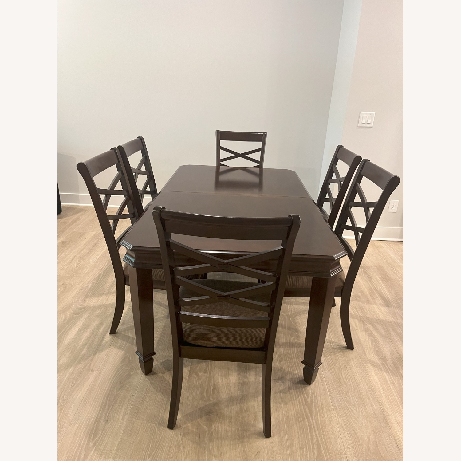 Ashley Furniture Solid Wood Extendable Dining Table - AptDeco