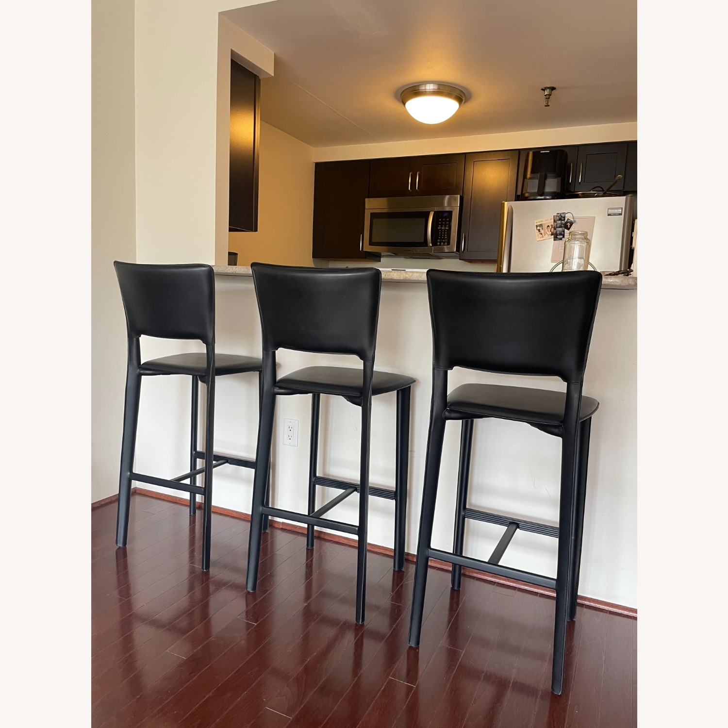 Maria Yee Black Leather Bar Stool - AptDeco