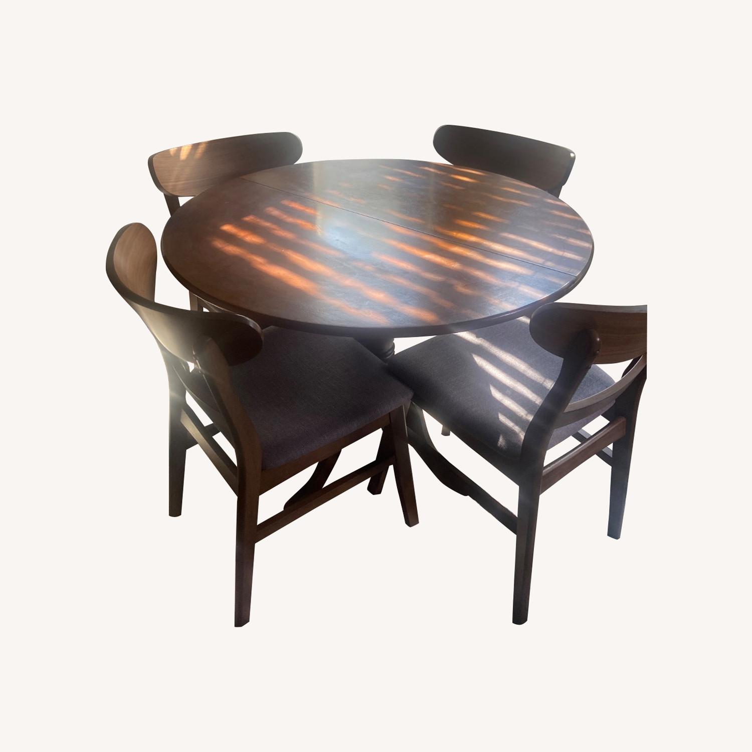 Saddle Brown Round Dining Table - AptDeco