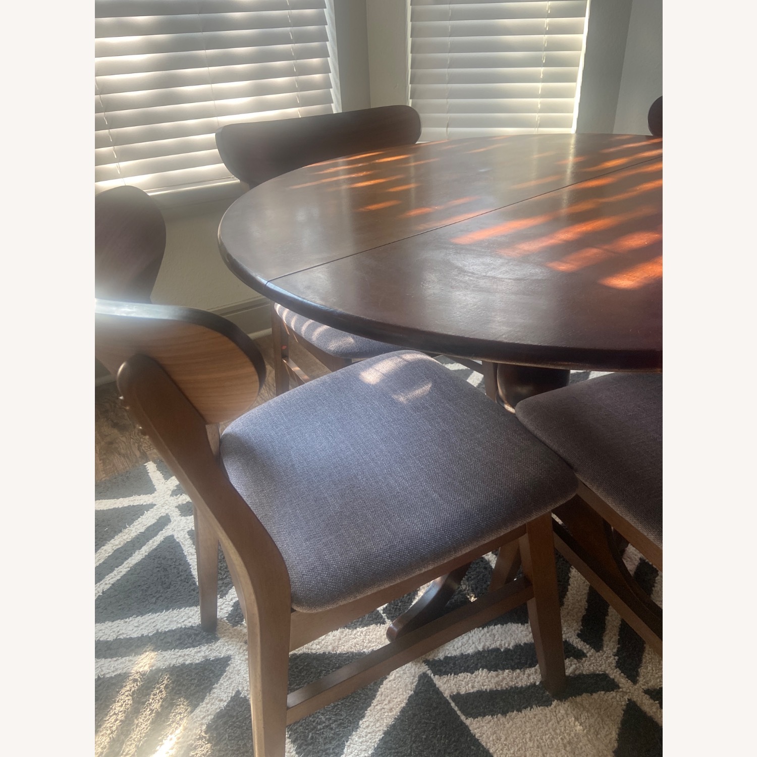 Saddle Brown Round Dining Table - AptDeco