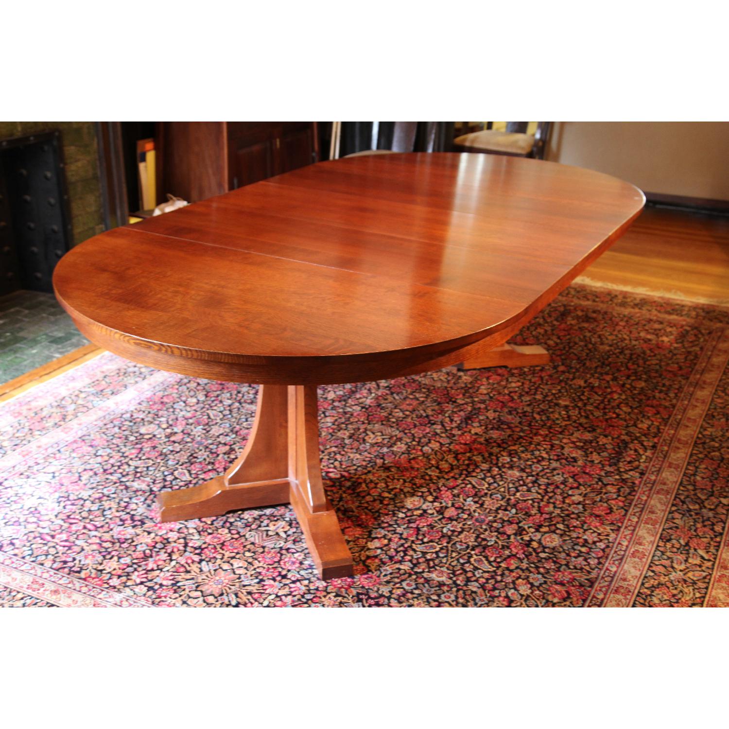 Stickley Round Pedestal Dining Room Table in Solid Oak - AptDeco